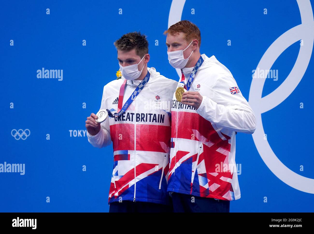 Great Britain's Tom Dean (right) with his gold medal after winning the ...