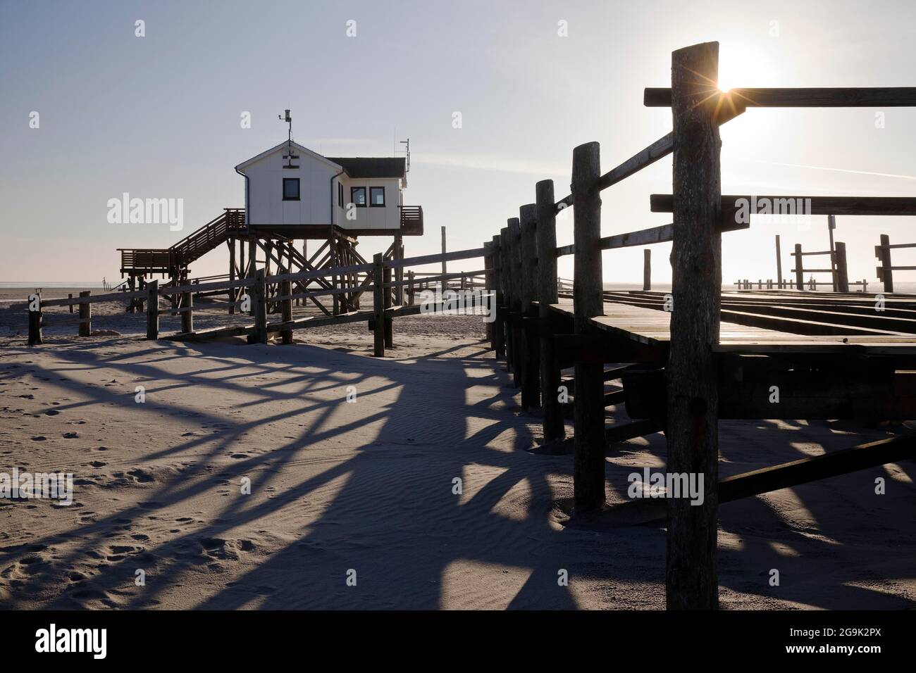 Pile dwelling in the mudflats at low tide, Sankt Peter-Ording, Wadden ...