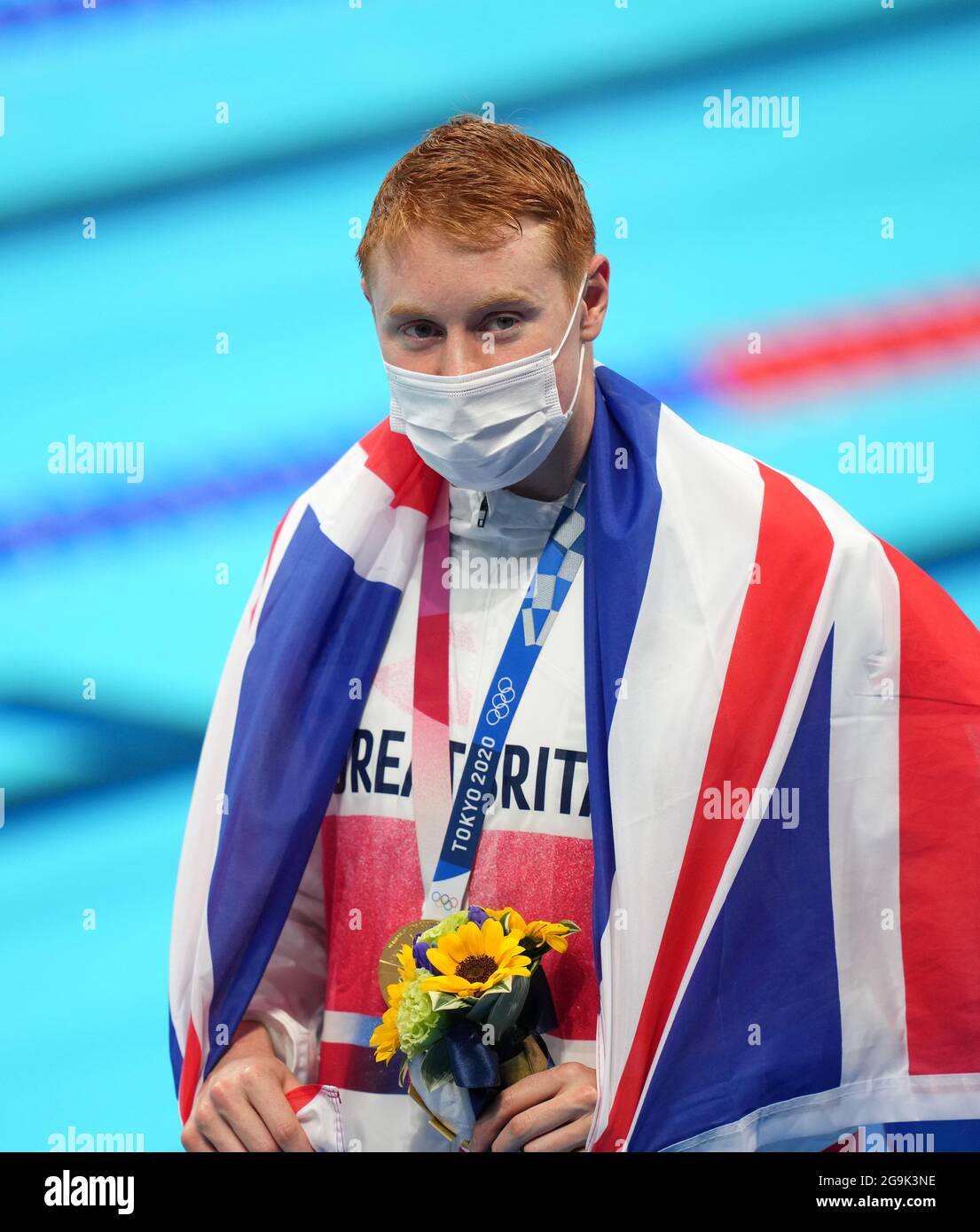 Great Britain's Tom Dean with his gold medal celebrates after winning ...
