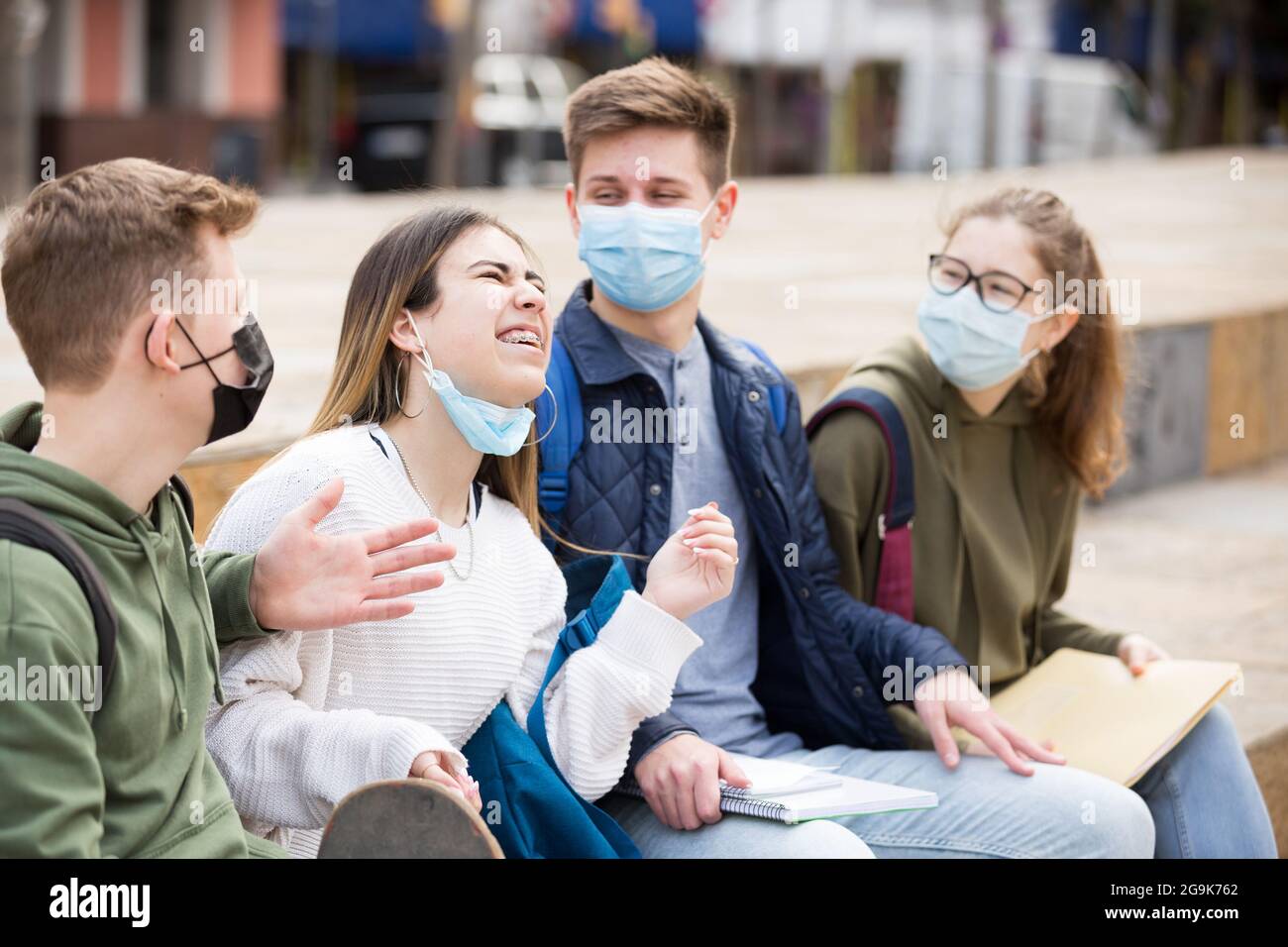 Diverse group of teens wearing masks hi-res stock photography and ...