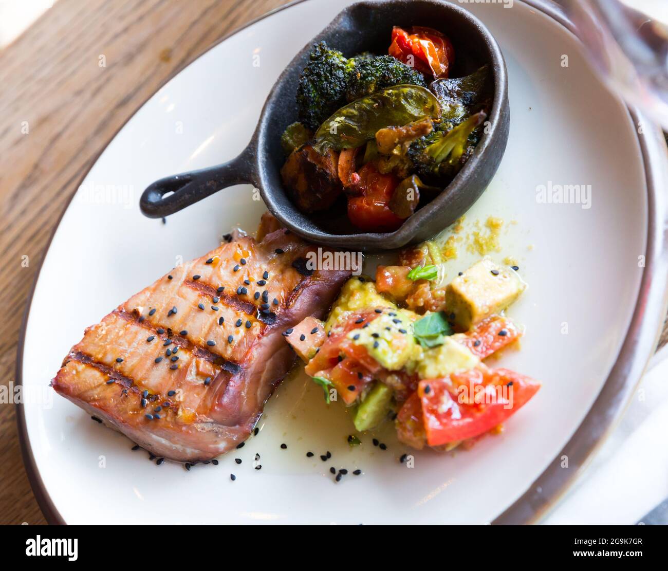 Braised tuna fillet with vegetables Stock Photo - Alamy