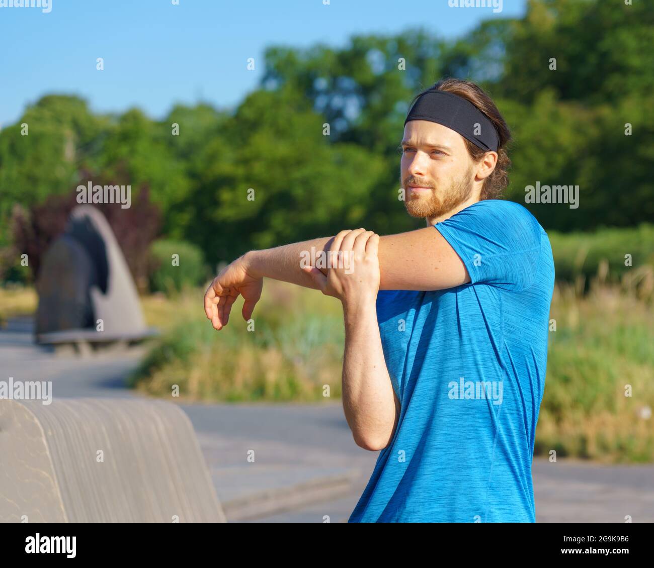 Guy warming muscles workout athlete hi-res stock photography and images ...