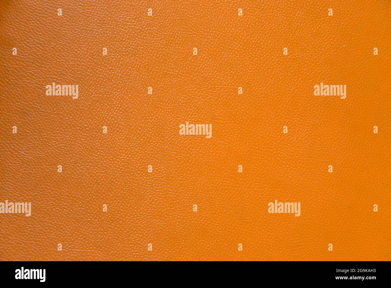 Orange color leather texture background Stock Photo - Alamy