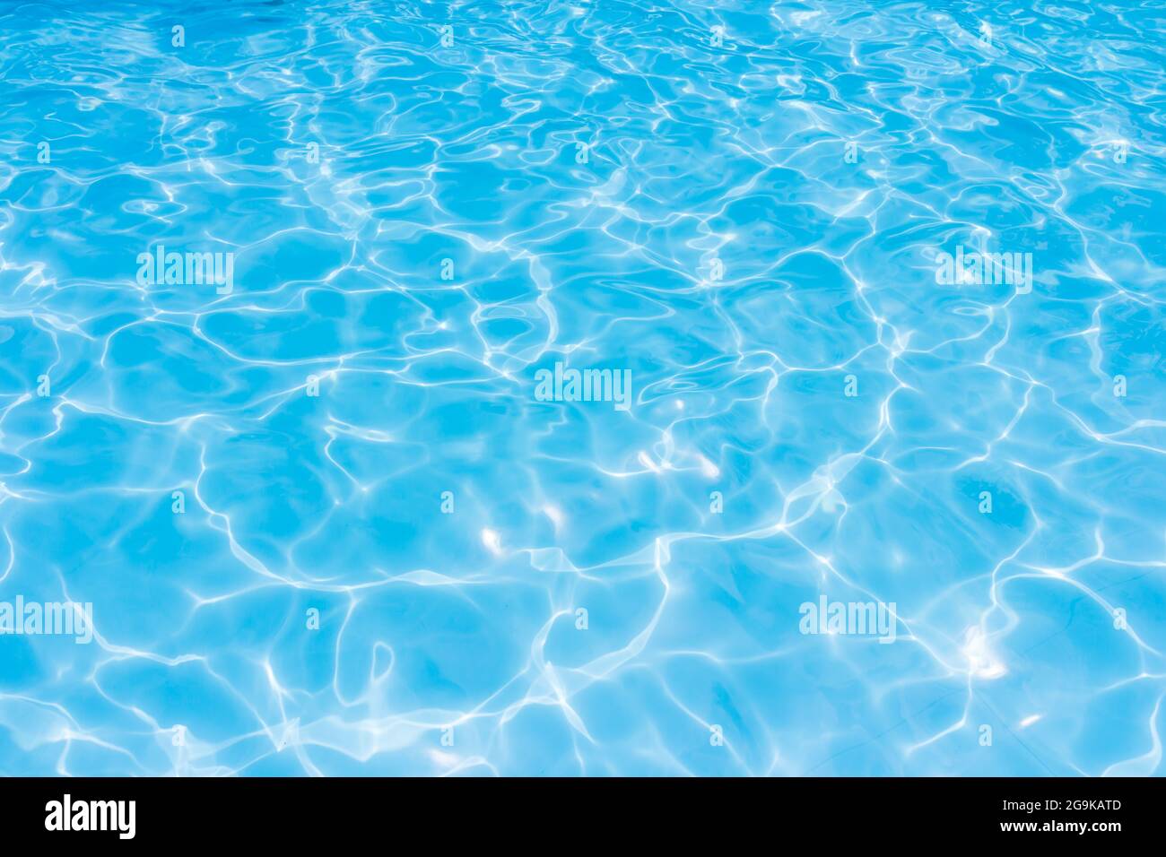 Light Blue swimming pool rippled water texture reflection Stock Photo ...