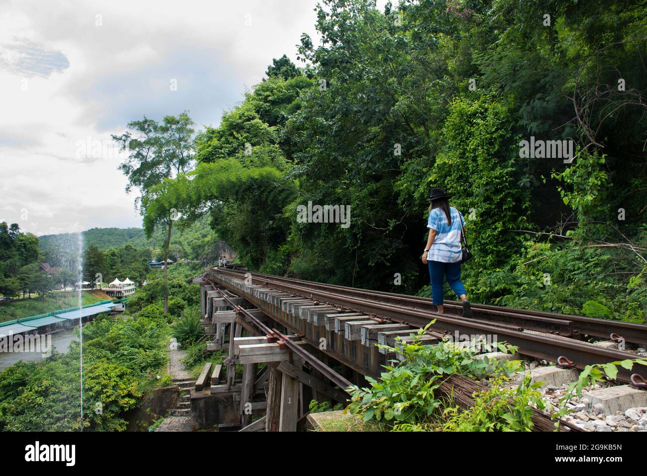 Travelers thai women people walking on track between hellfire pass ...