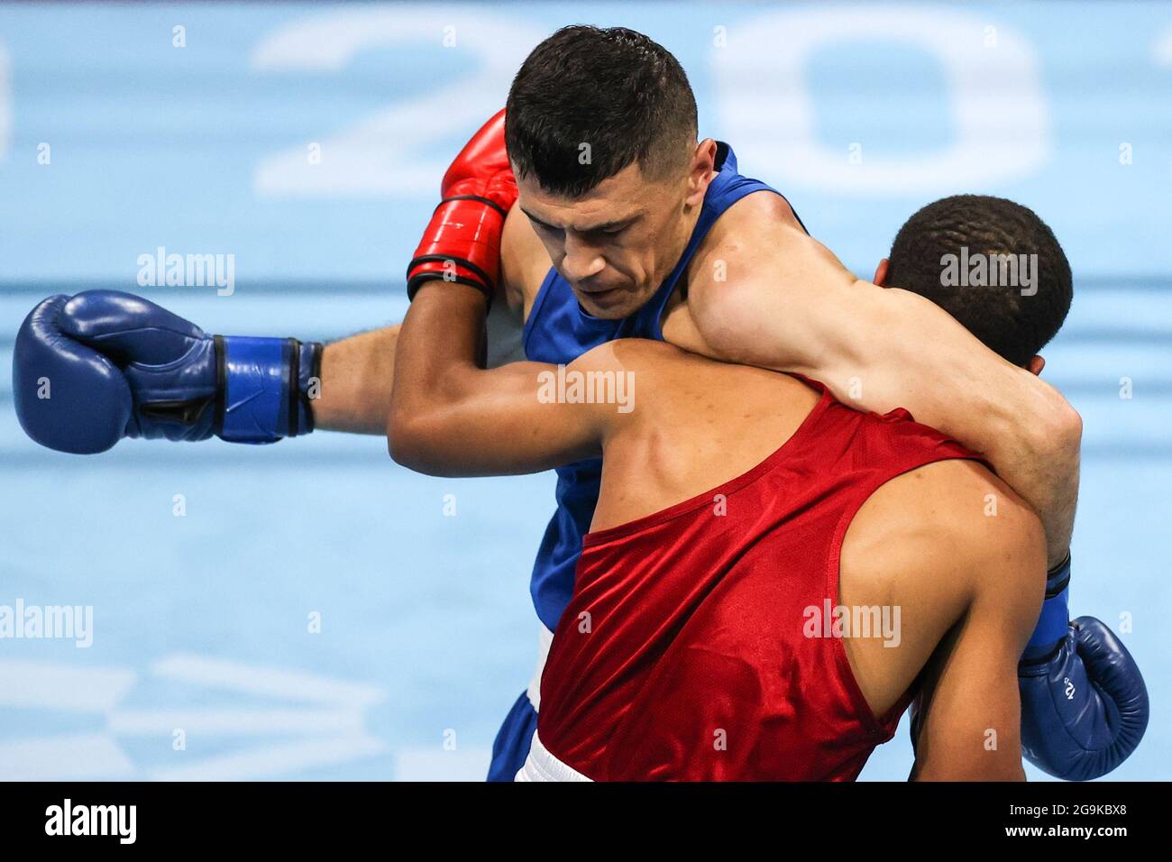 Tokyo, Japan. 27th July, 2021. Bobo-Usmon Baturov of Uzbekistan (in ...
