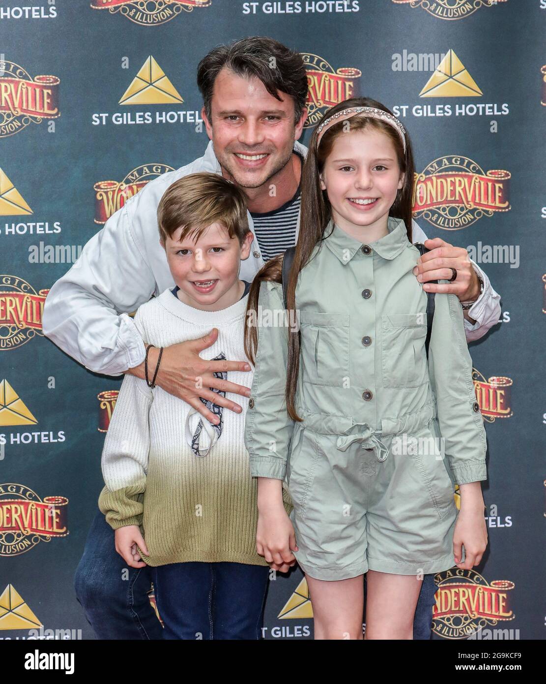 London, UK. 26th July, 2021. Neil McDermott and kids attend a gala ...