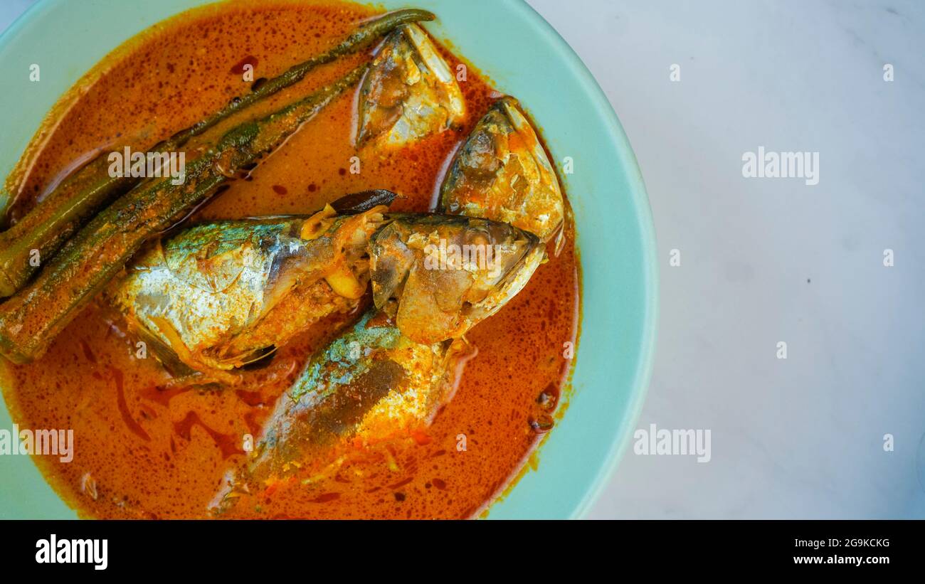 Delicious homemade Mackerel fish curry with lady finger cooked in ...