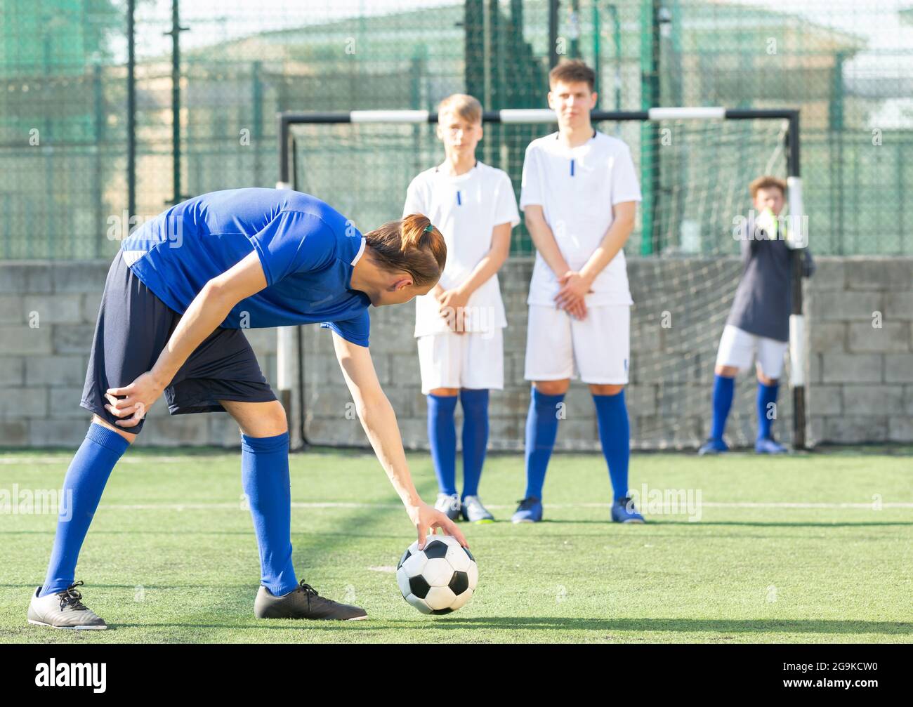 Free kick on goal in football Stock Photo - Alamy