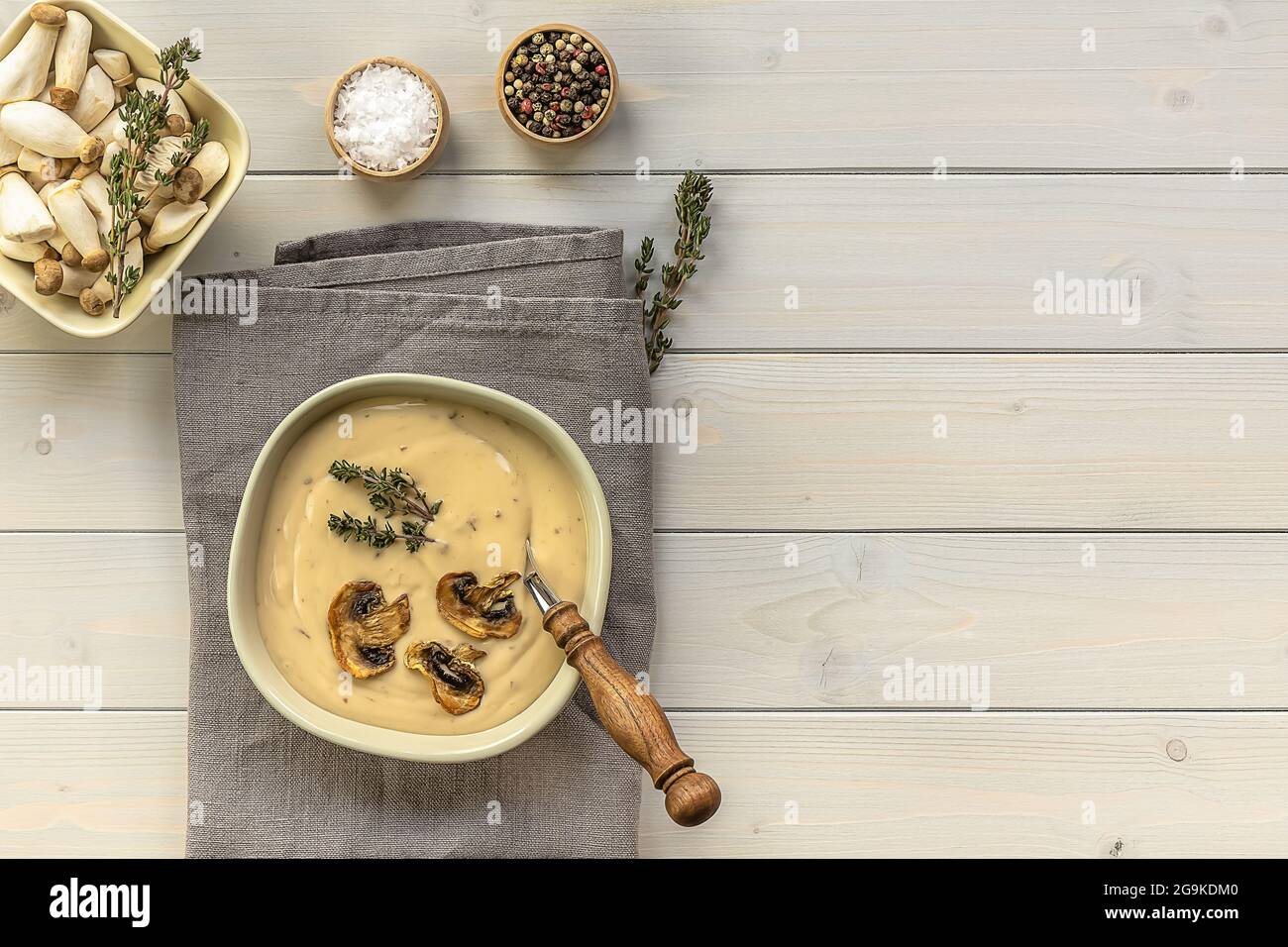 Fresh homemade mushroom cream soup on wooden table Stock Photo - Alamy