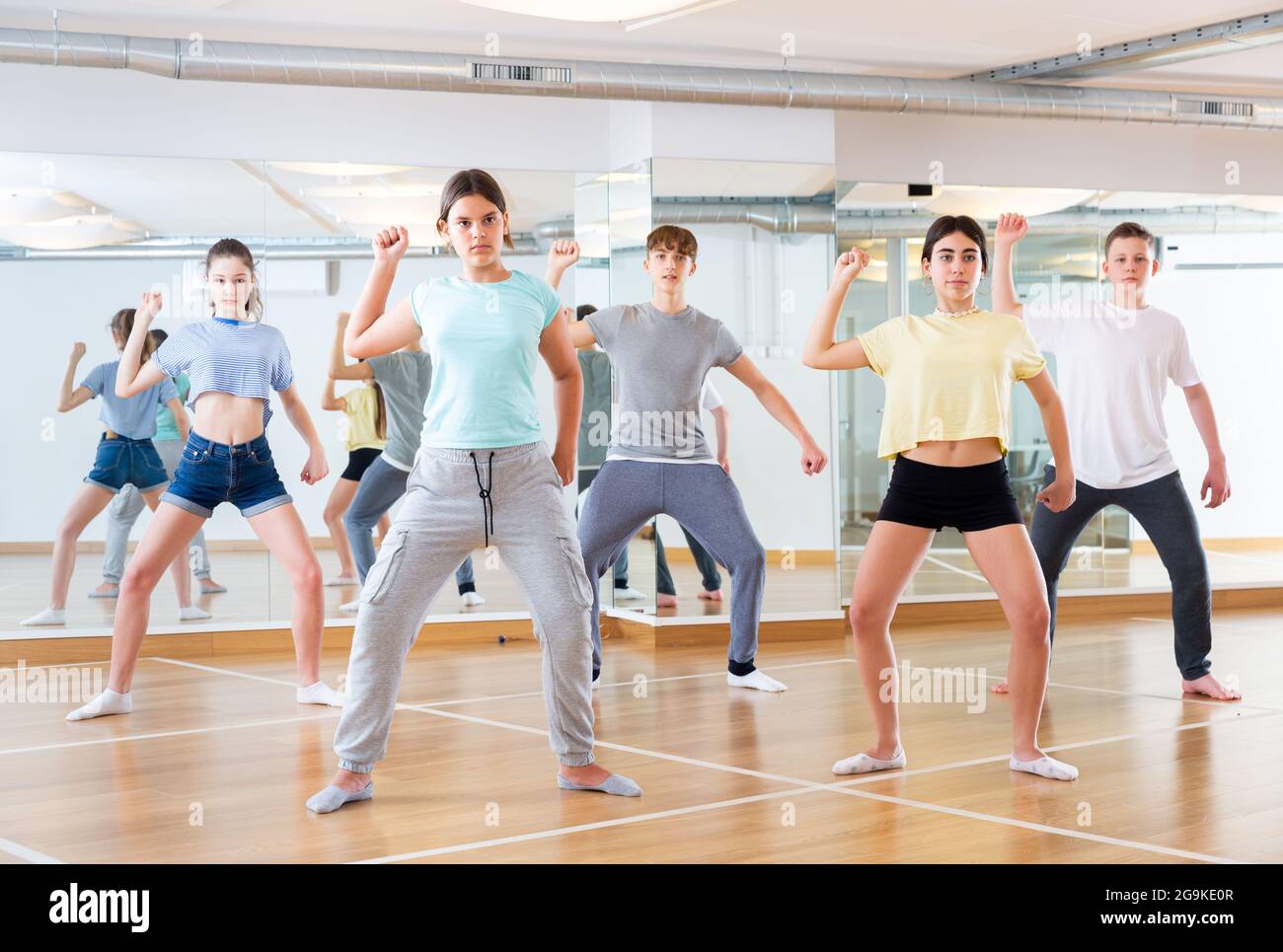 Teenage dancers practicing new dance in studio Stock Photo - Alamy