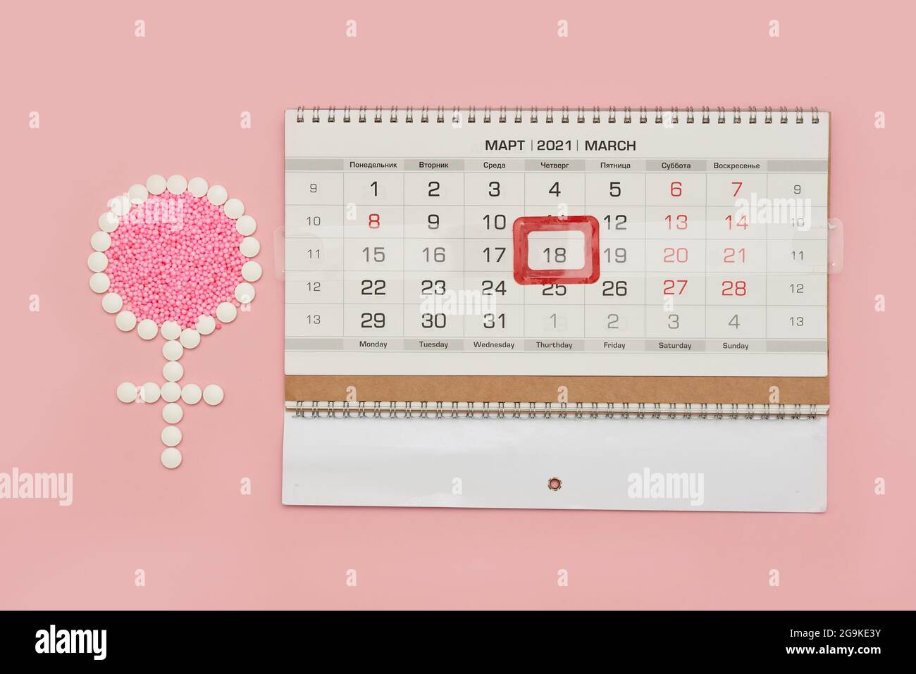 Female's symbol made of tablets and menstrual calendar. Female period ...