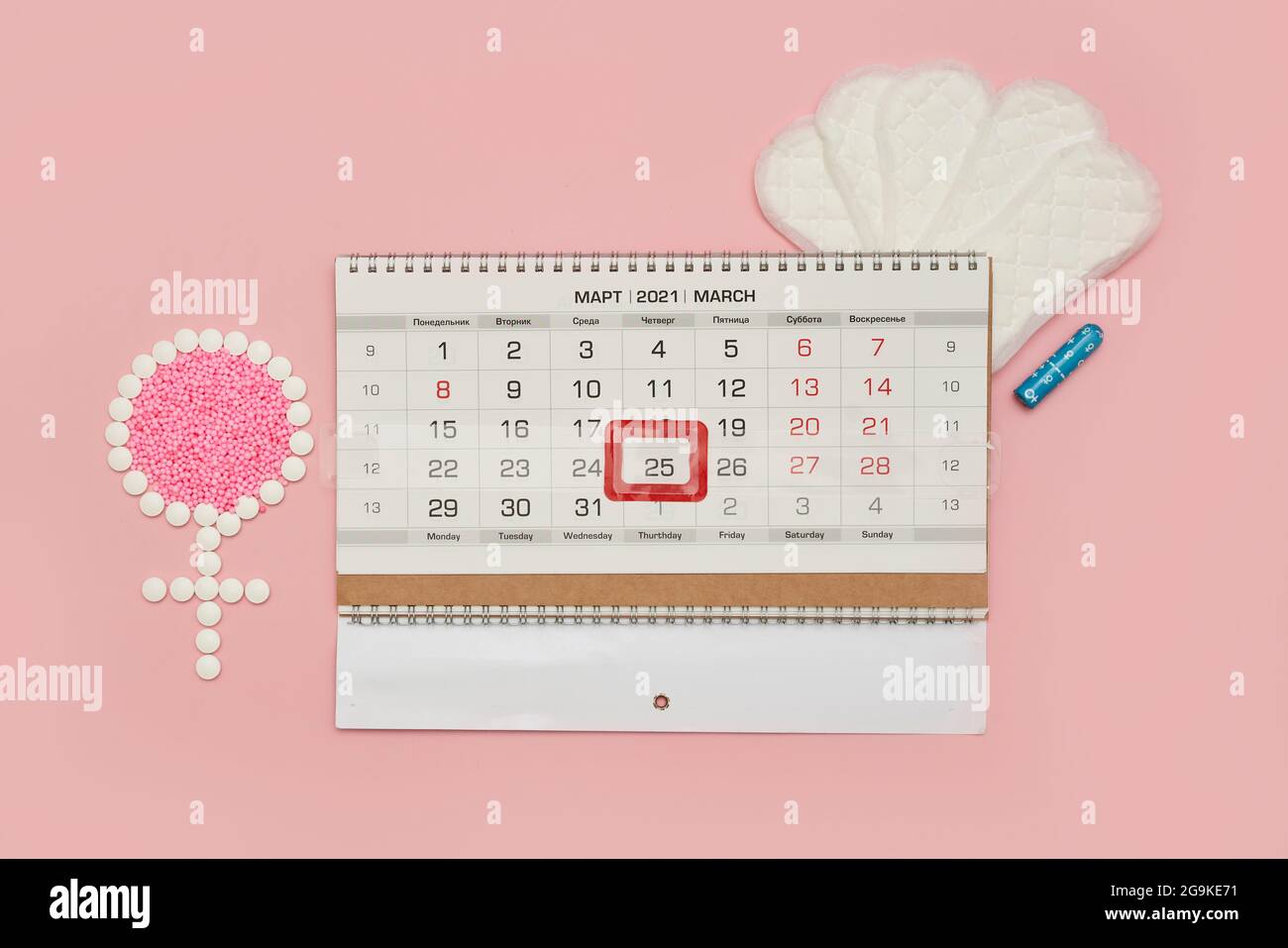 Female's symbol made of tablets and menstrual calendar. Female period ...