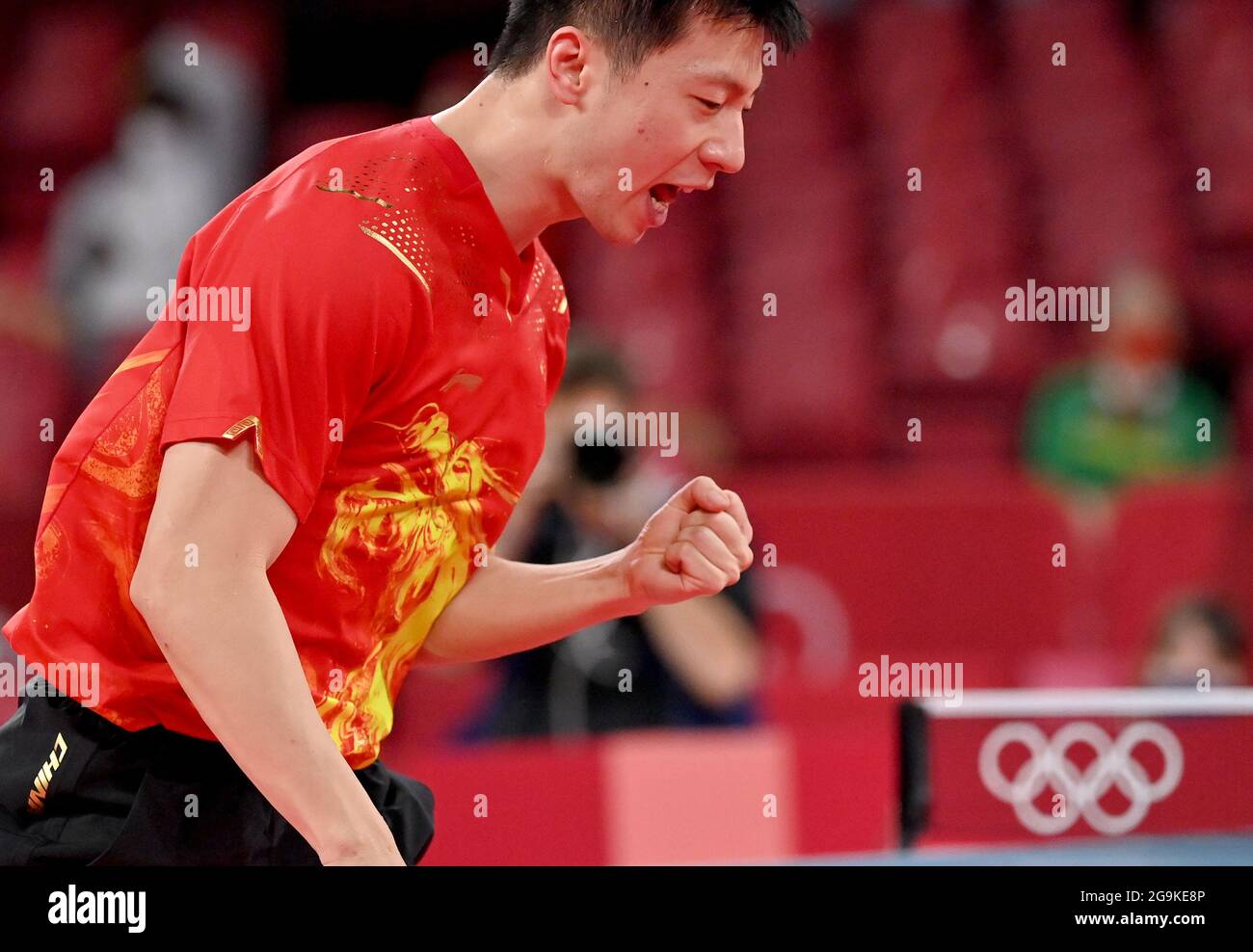 Tokyo, Japan. 27th July, 2021. Ma Long of China jubilates for scoring ...