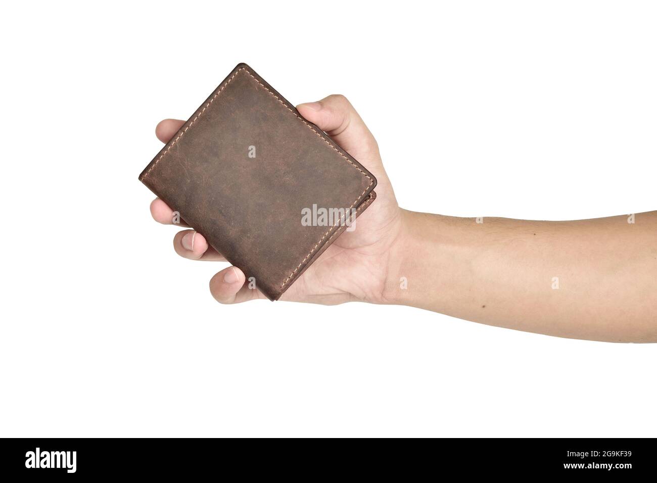 Leather wallet in hand isolated on white background with clipping path ...