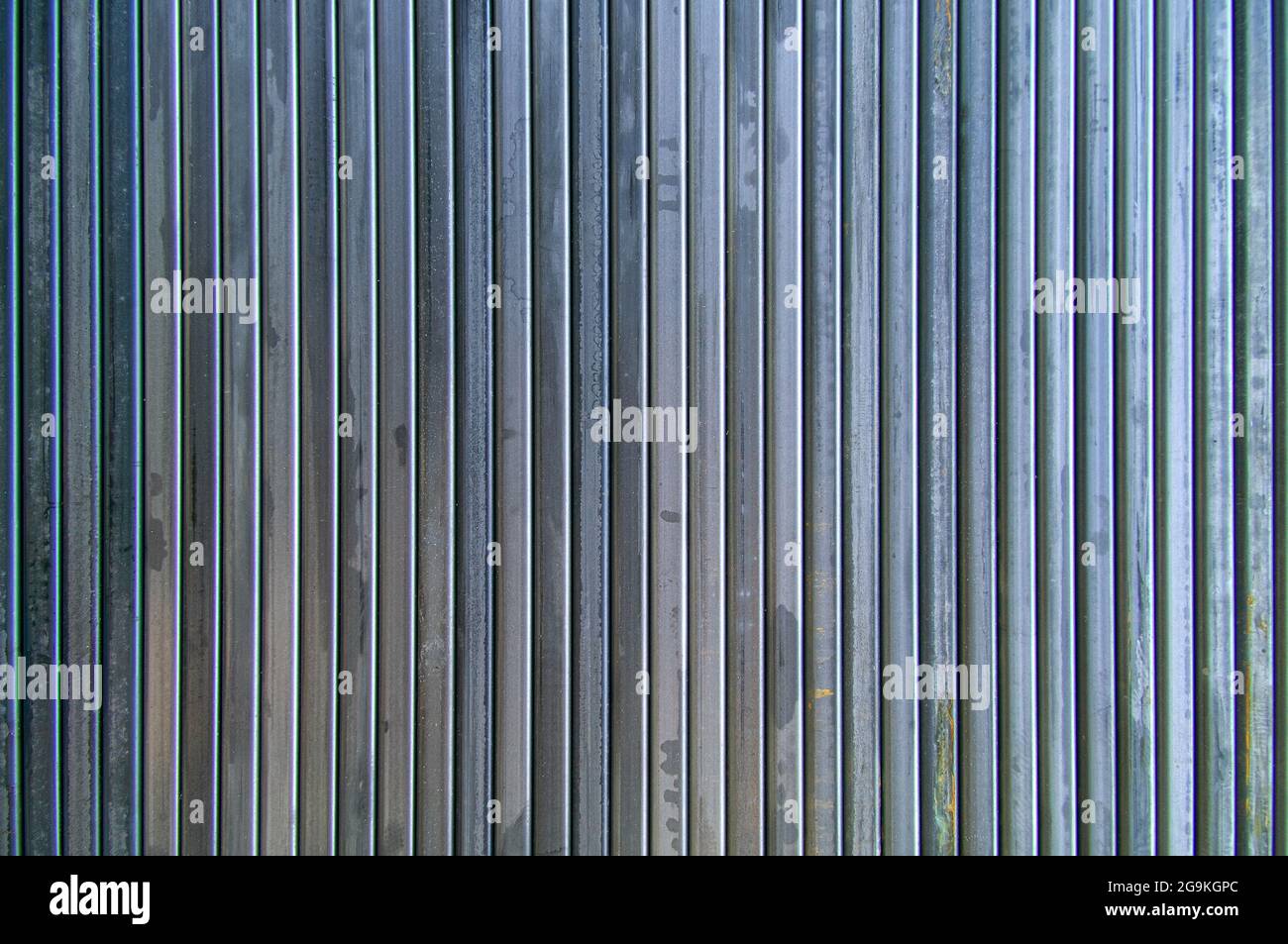 background from steel pipes. shaped steel pipes. several metal pipes ...