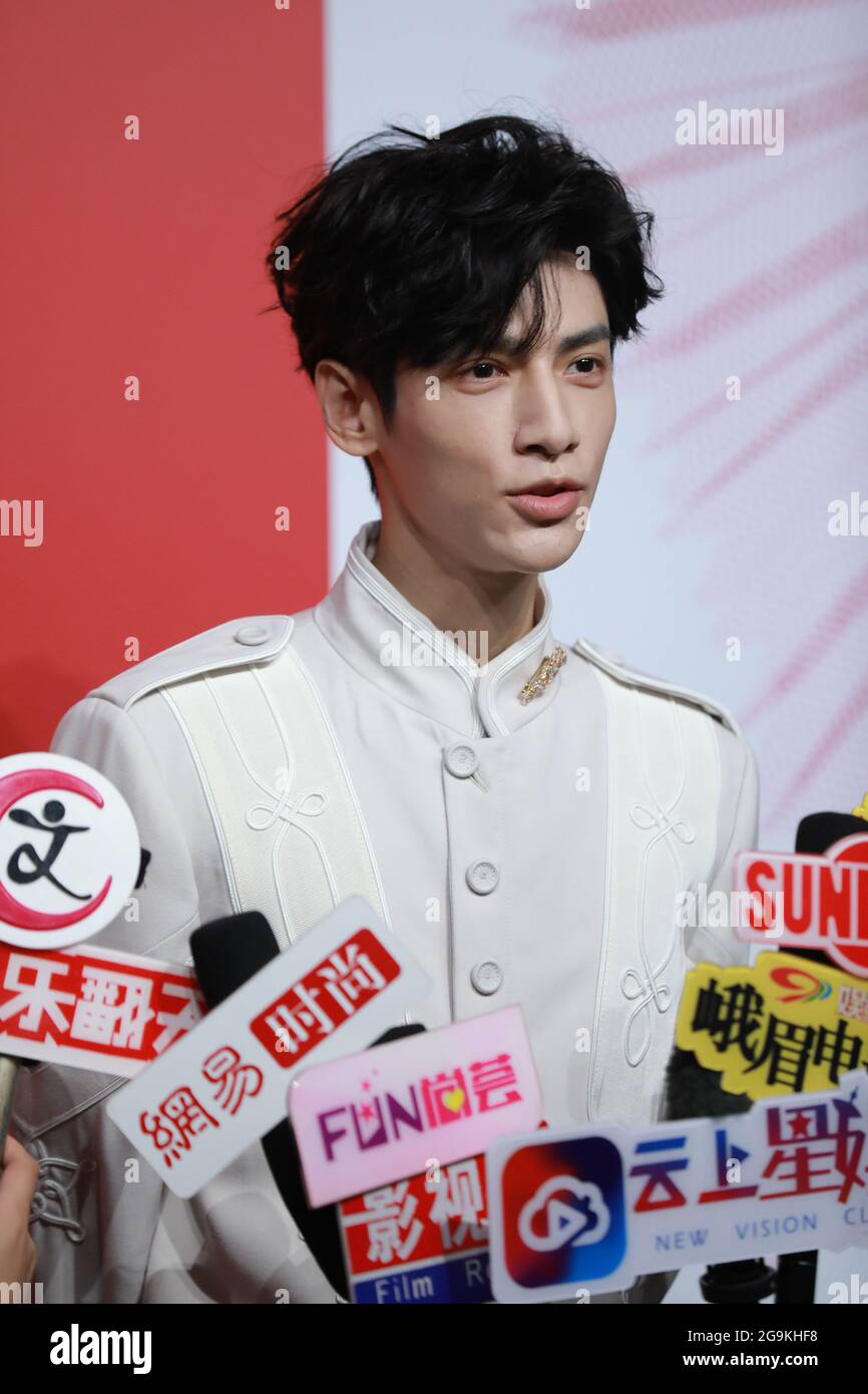 Chinese actor Luo Yunxi, also known as Leo Luo, attends an exhibition ...