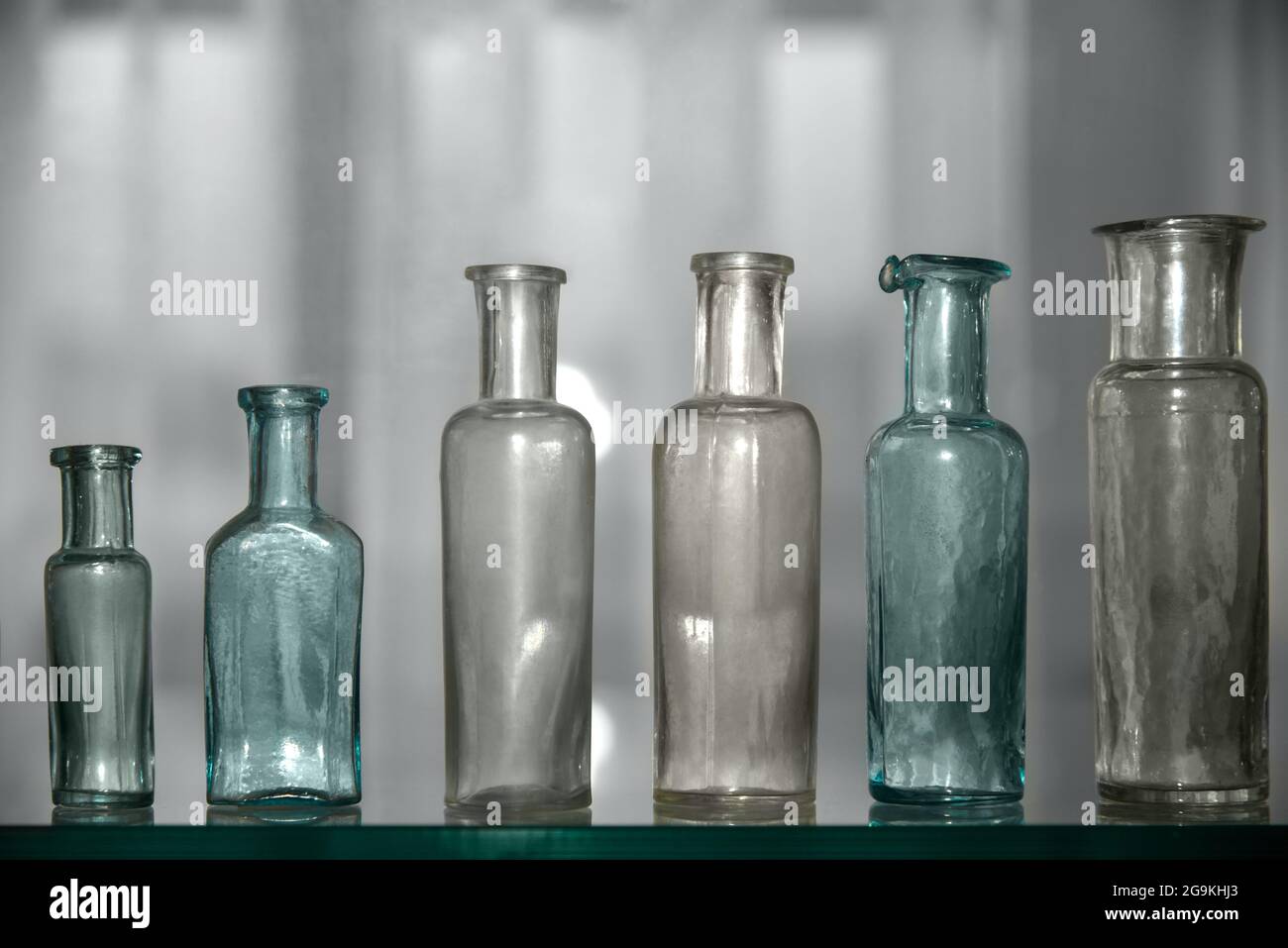 Old glass medical vessels for medicines Stock Photo - Alamy