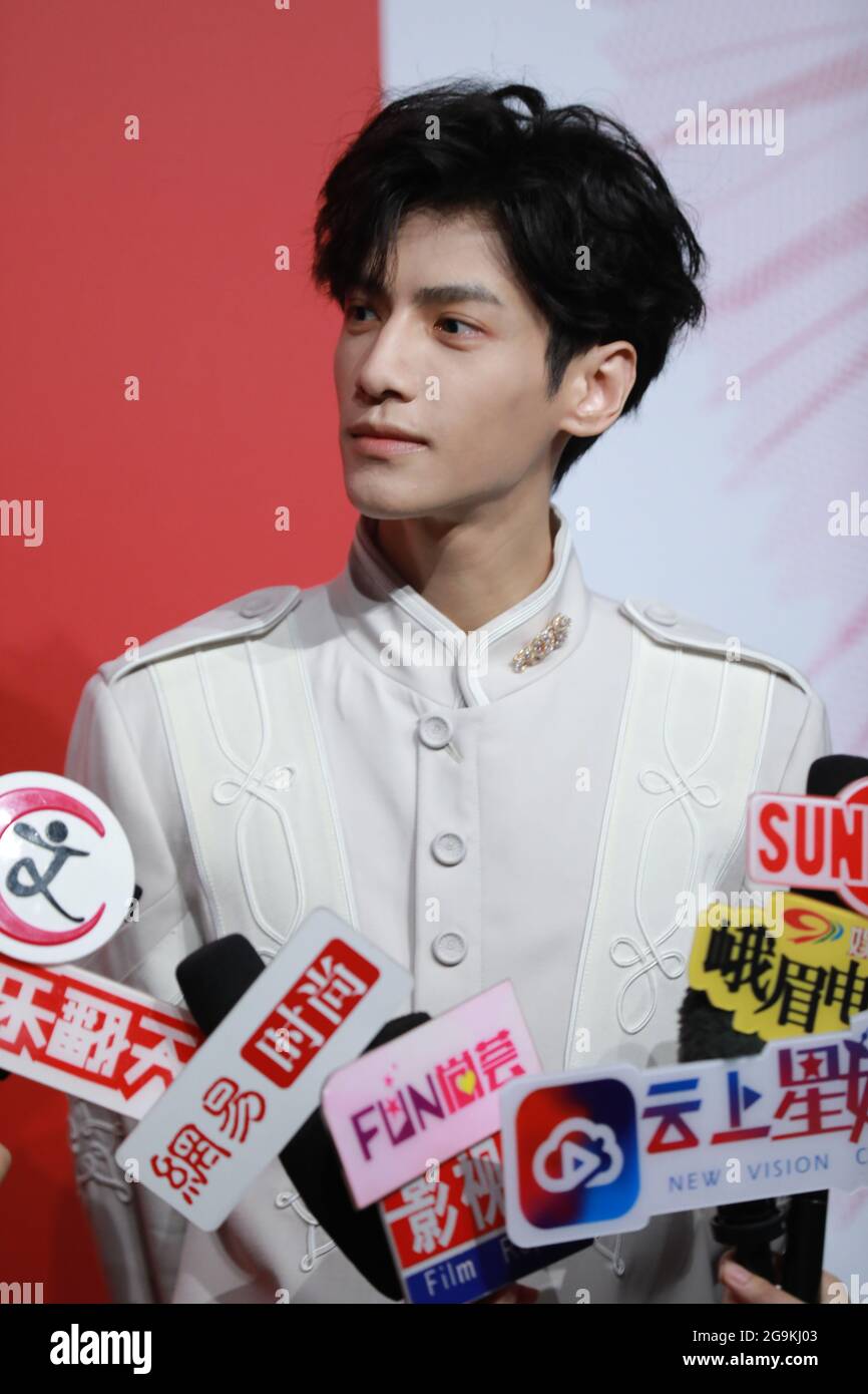 Chinese actor Luo Yunxi, also known as Leo Luo, attends an exhibition ...