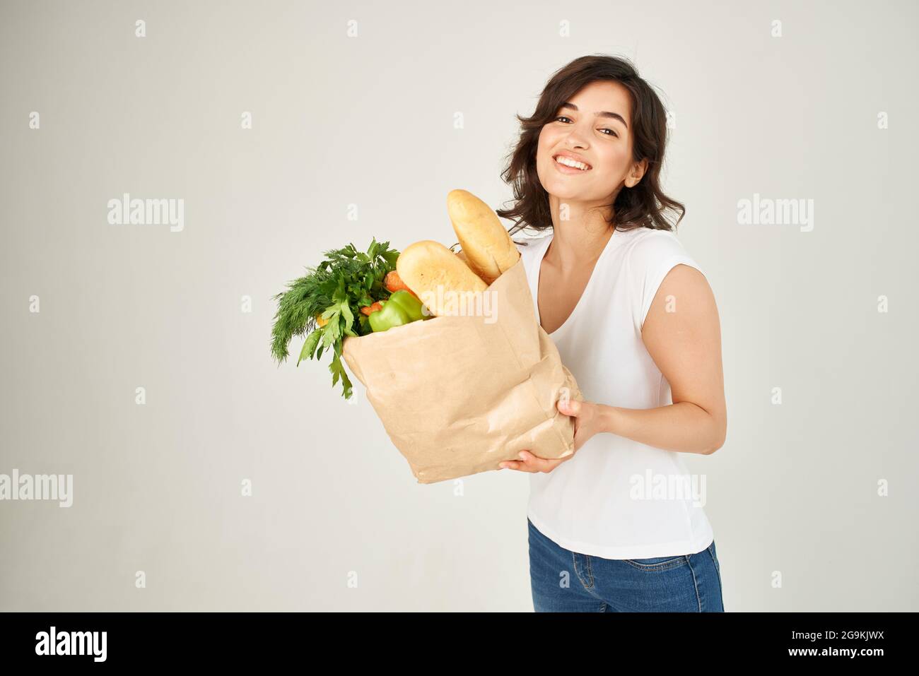 woman with package of groceries supermarket delivery service Stock ...