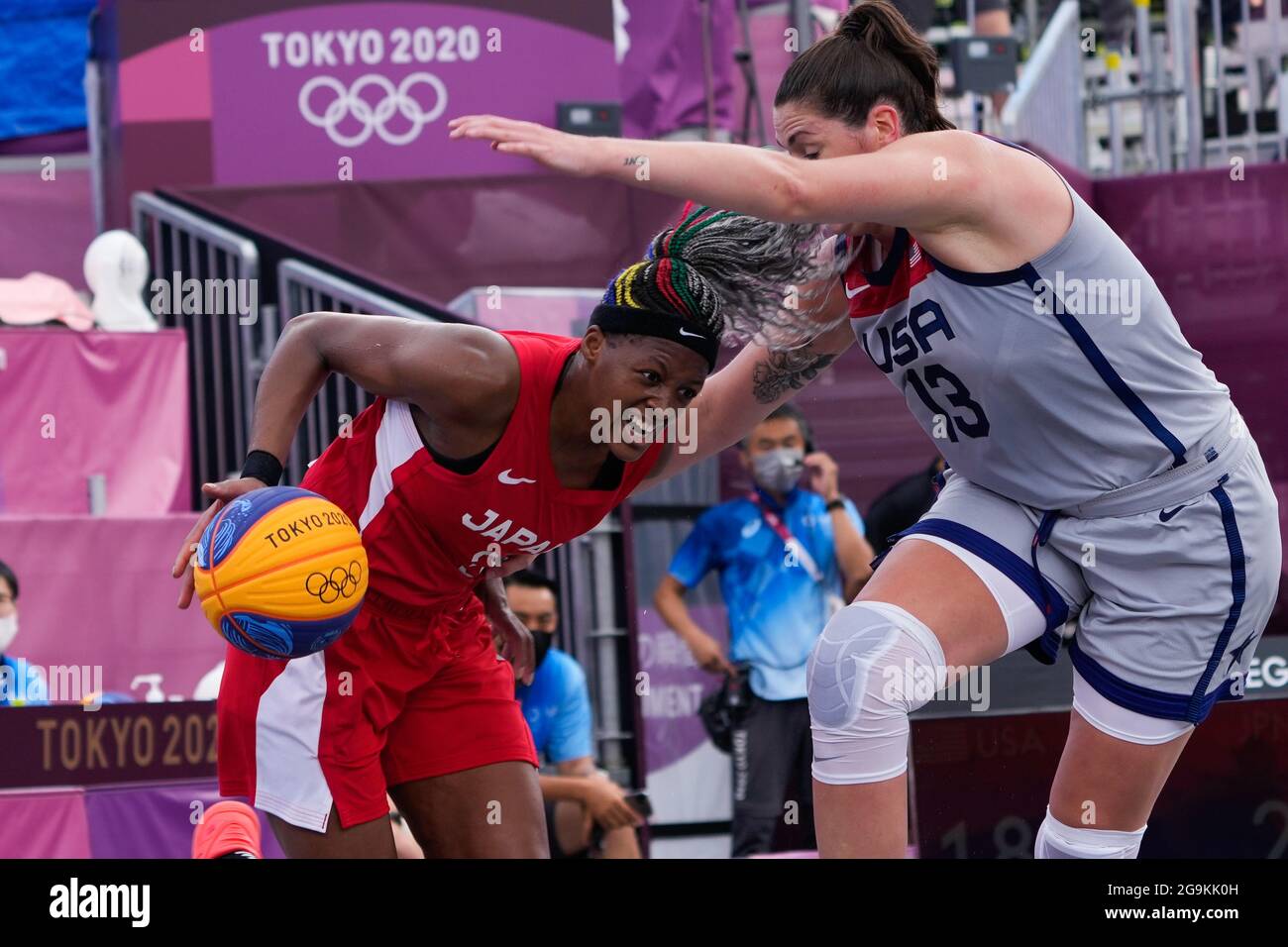 Tokyo, Japan. 27th July, 2021. Mawuli Stephanie (L) of Japan competes ...