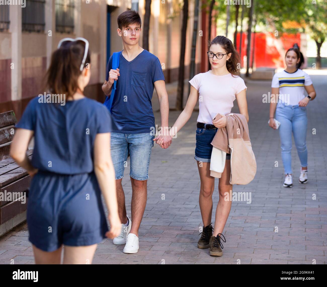 Two high school students walking outside hi-res stock photography and ...