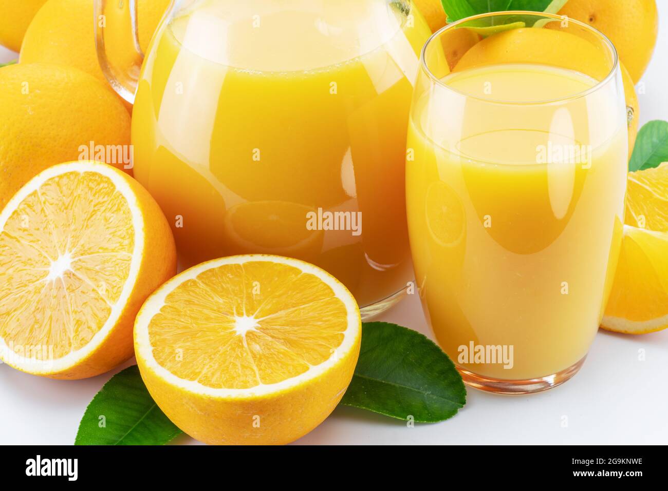 Yellow orange fruits and fresh orange juice isolated on white ...
