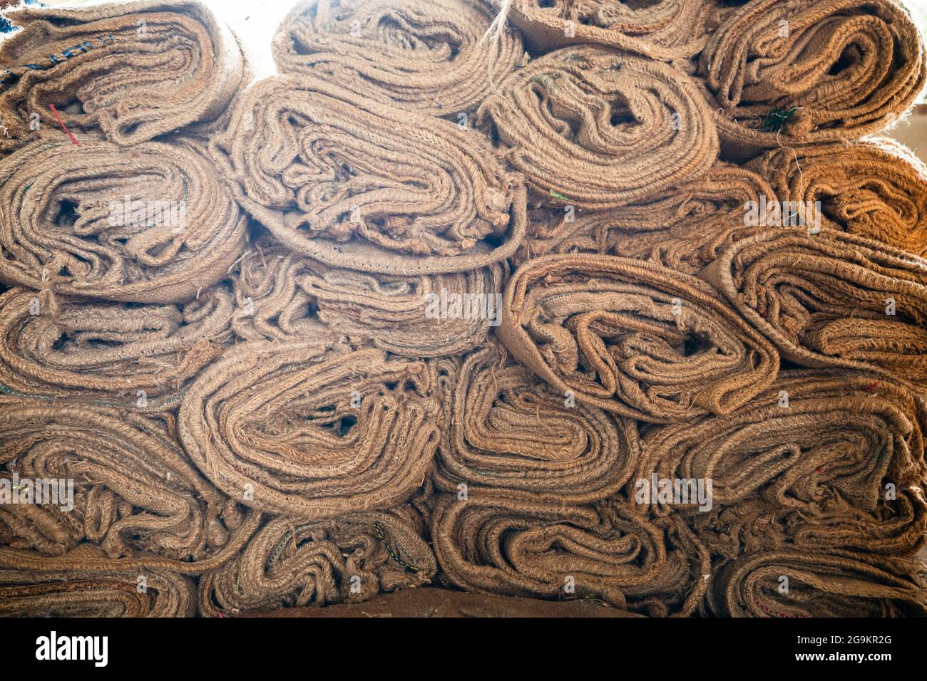 Pile of an old brown rice sack in a factory Stock Photo - Alamy