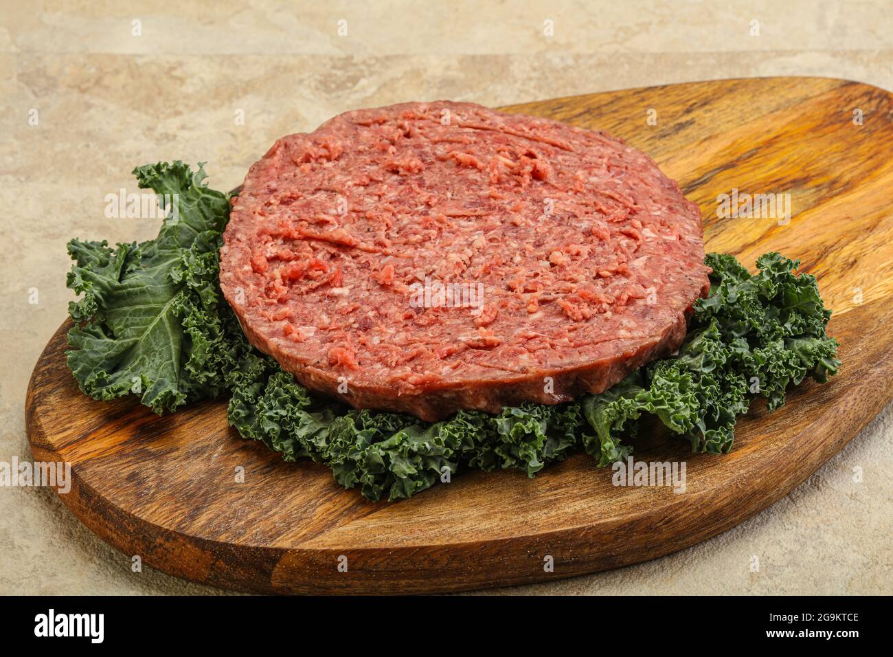 Raw beef burger cutlet for grill burger Stock Photo - Alamy