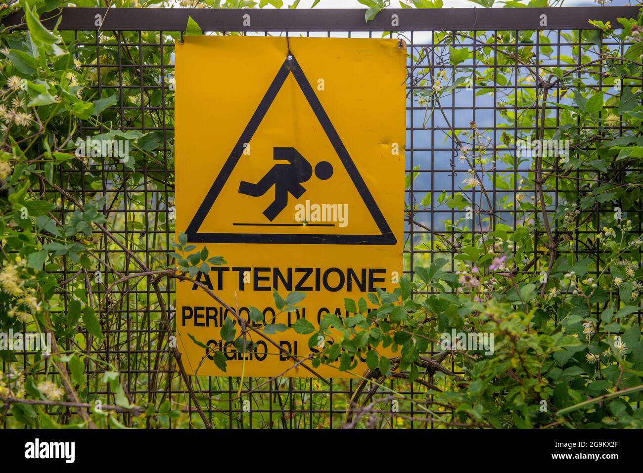 warning sign of danger of falling Stock Photo - Alamy