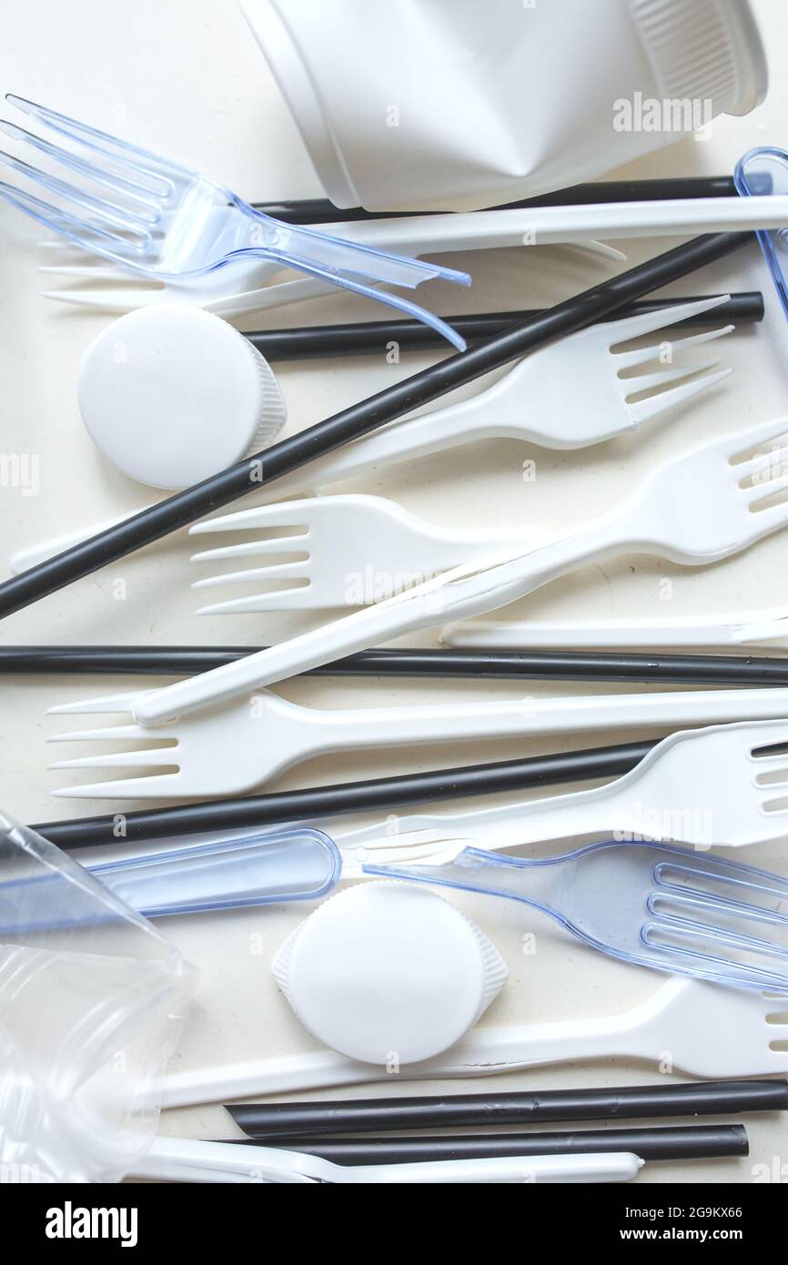 White plastic garbage on a white background. The concept of plastic ...