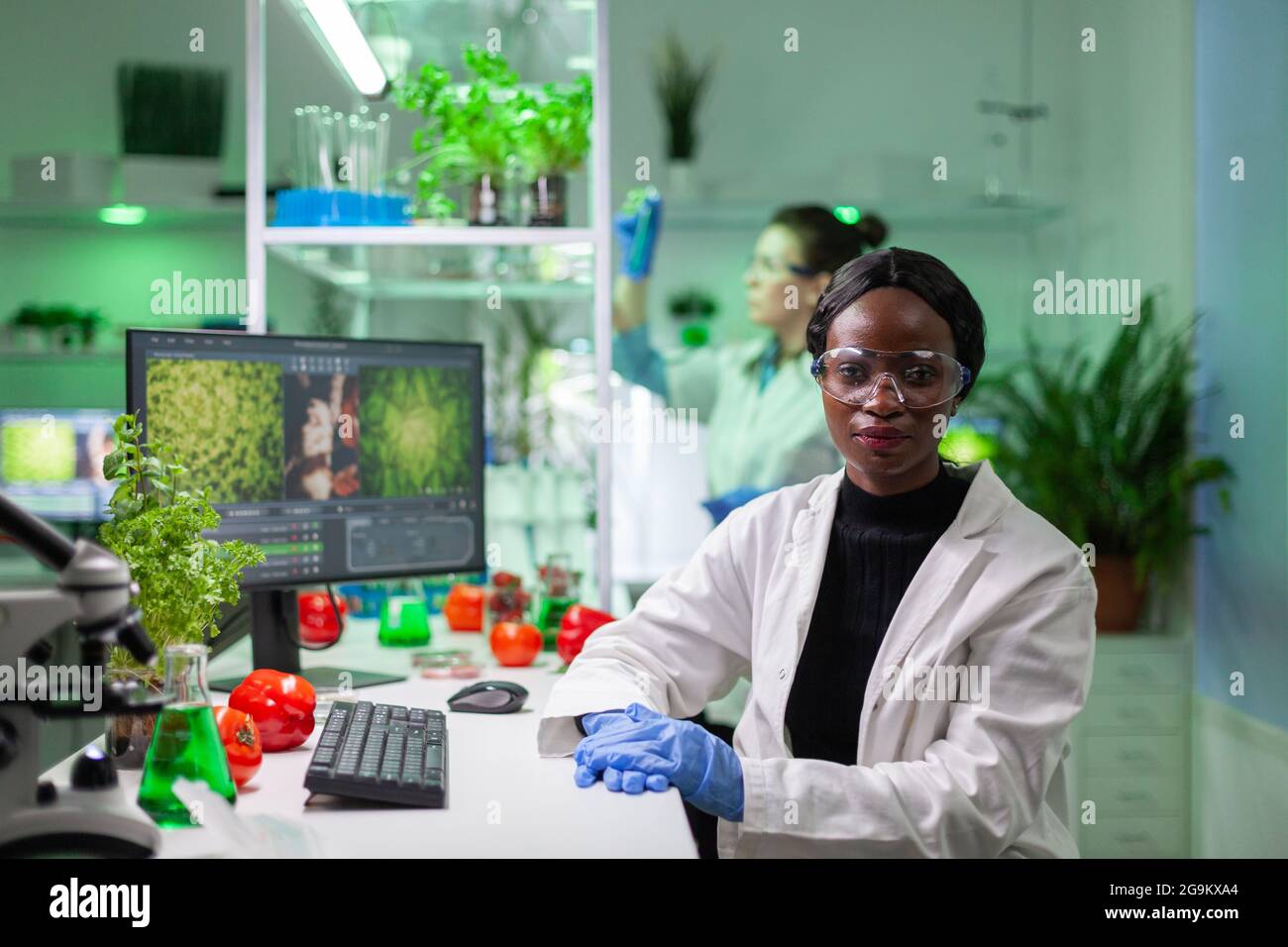 Woman standing looking dna hi-res stock photography and images - Alamy