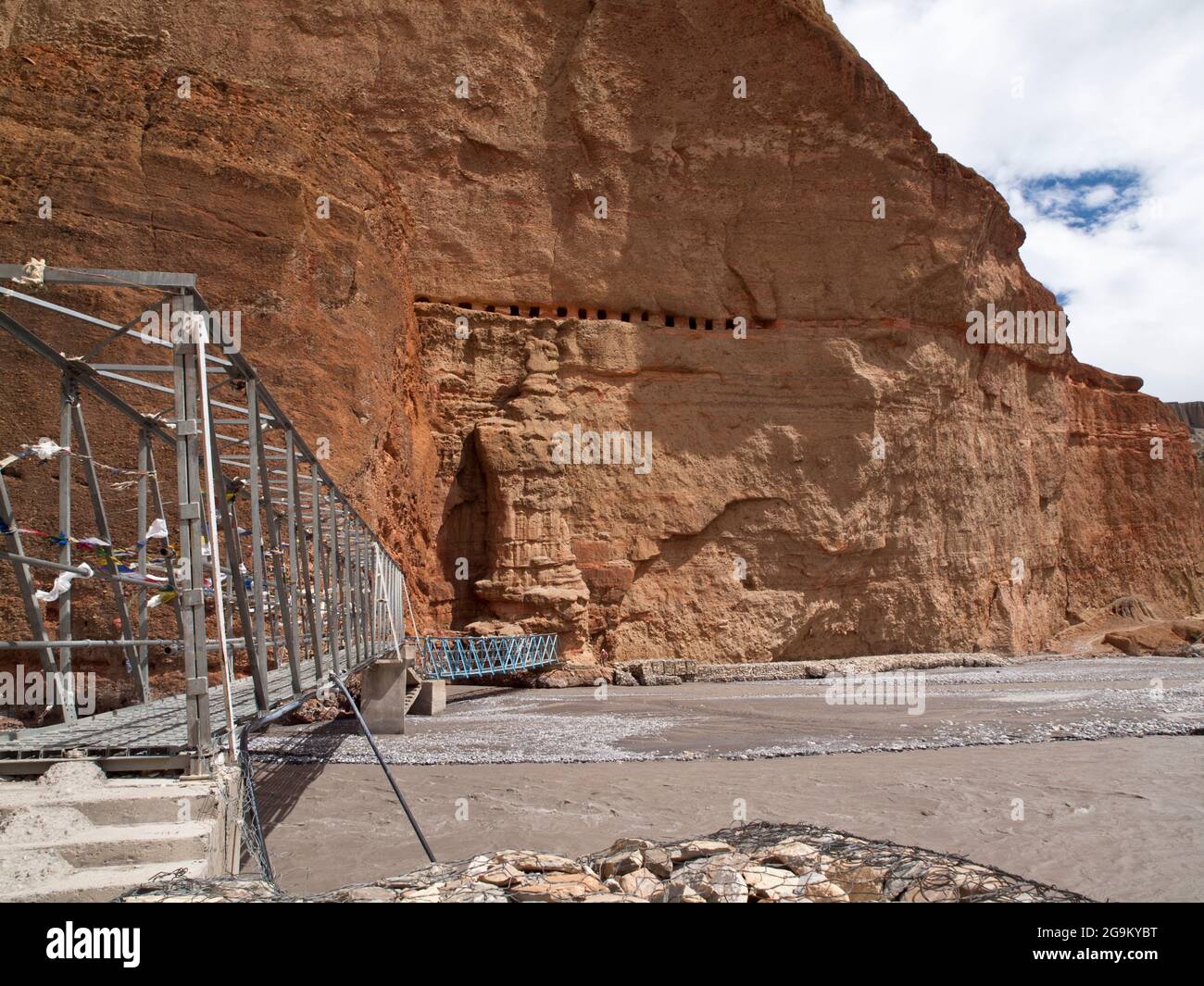 Buddhist cliff "sky" caves above Kali Gandaki bridge near Chele, Upper ...