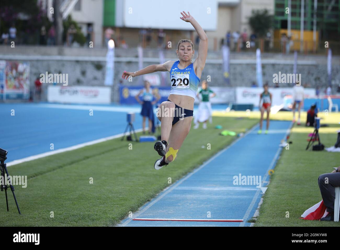 ISTANBUL, TURKEY - JUNE 13, 2021: Undefined athlete long jumping during ...