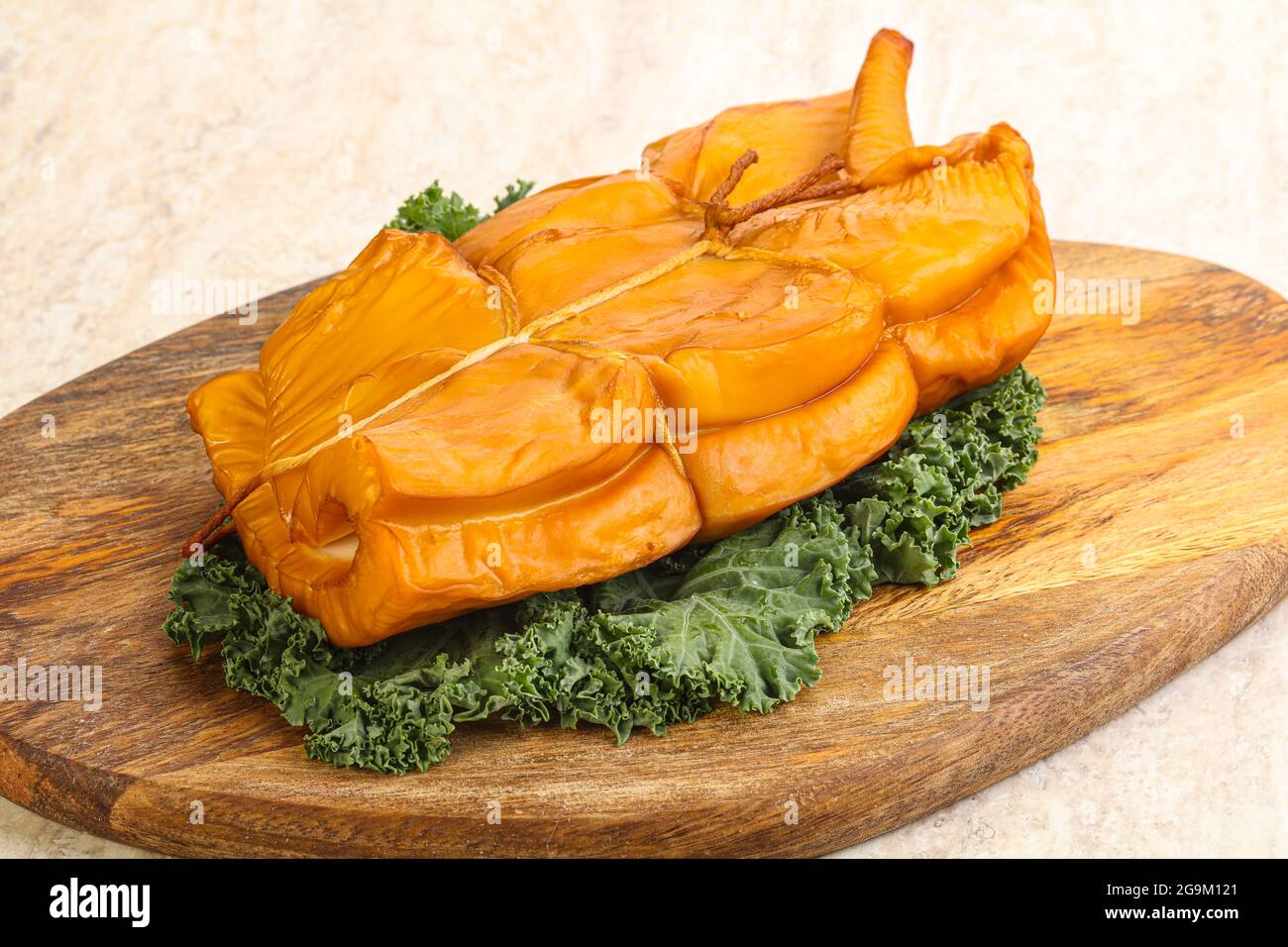 Smoked squid calamar appetizer snack isolated Stock Photo - Alamy