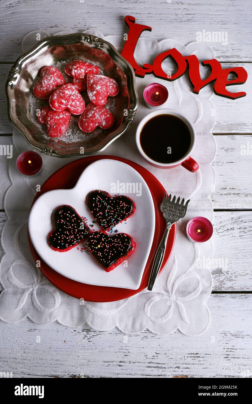 Romantic still life with cookies in form of heart on color wooden ...