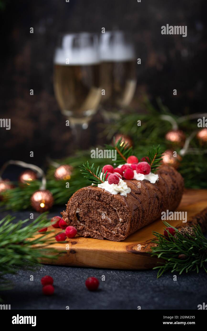 Christmas chocolate roll cake with cream Stock Photo - Alamy