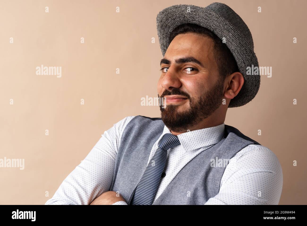 Close up portrait of young arab man in studio Stock Photo - Alamy