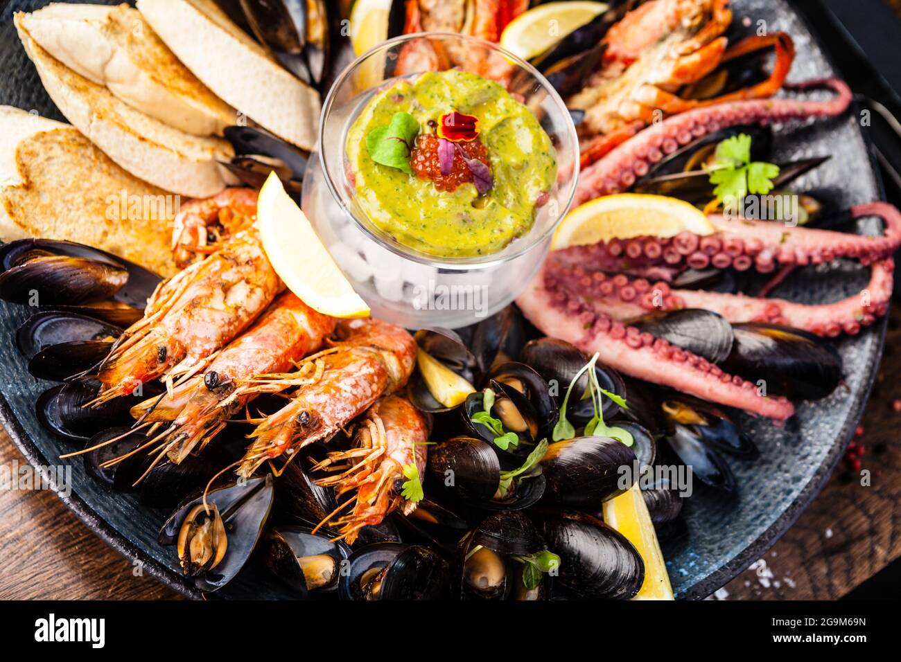 Seafood platter for 2-4 persons. Lobster, octopus, blue mussels ...