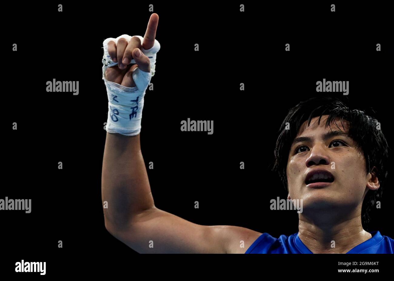 Tokyo, Japan. 27th July, 2021. Chen Nien-chin of Chinese Taipei reacts ...