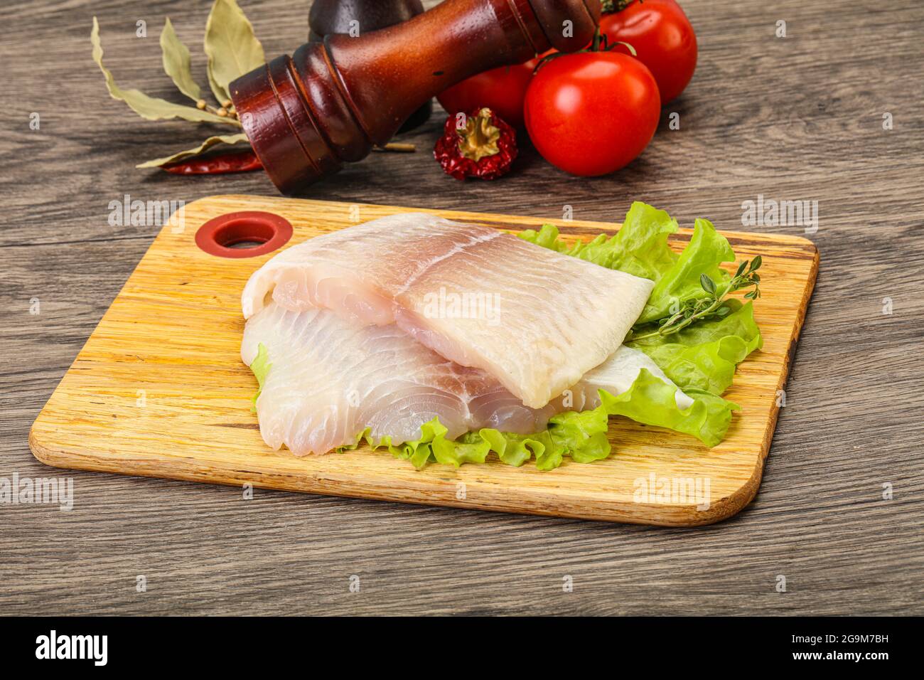 Raw pangasius fillet fish for cooking Stock Photo - Alamy