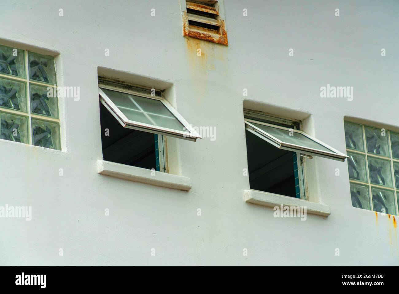 House with open windows on a hot summer day Stock Photo - Alamy