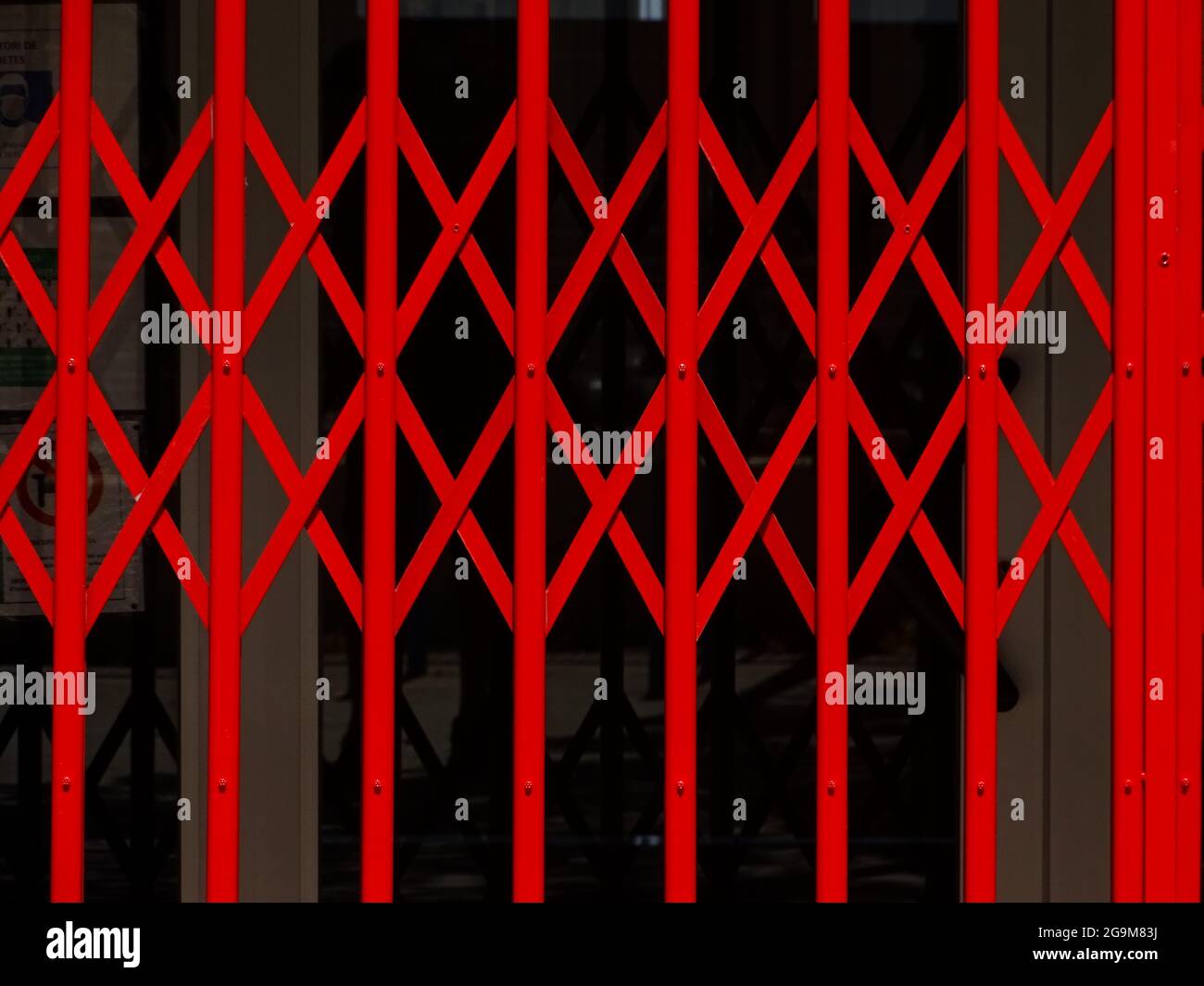 Pattern of red metal fence Stock Photo - Alamy