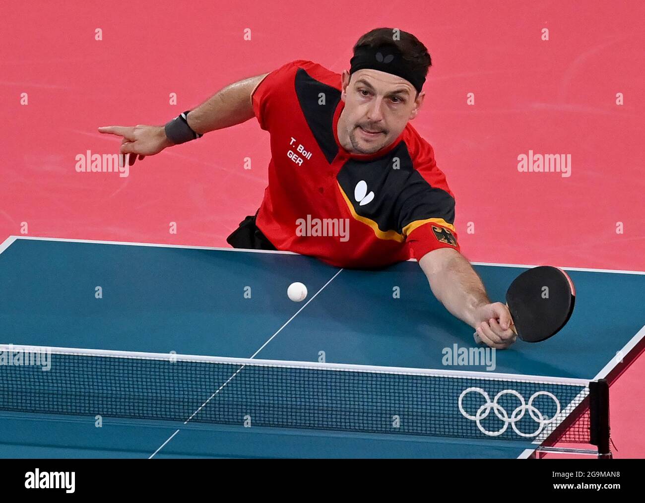 Tokyo, Japan. 27th July, 2021. Timo Boll of Germany reacts during the ...