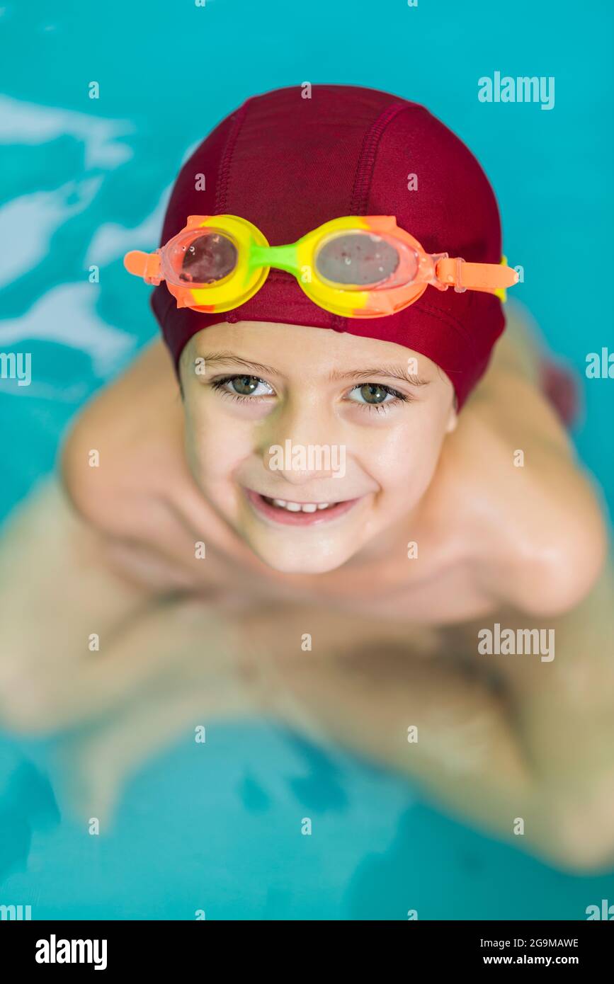 Red swimming cap hi-res stock photography and images - Alamy