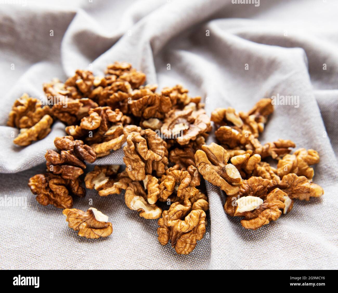Walnuts without shell on a concrete background Stock Photo - Alamy