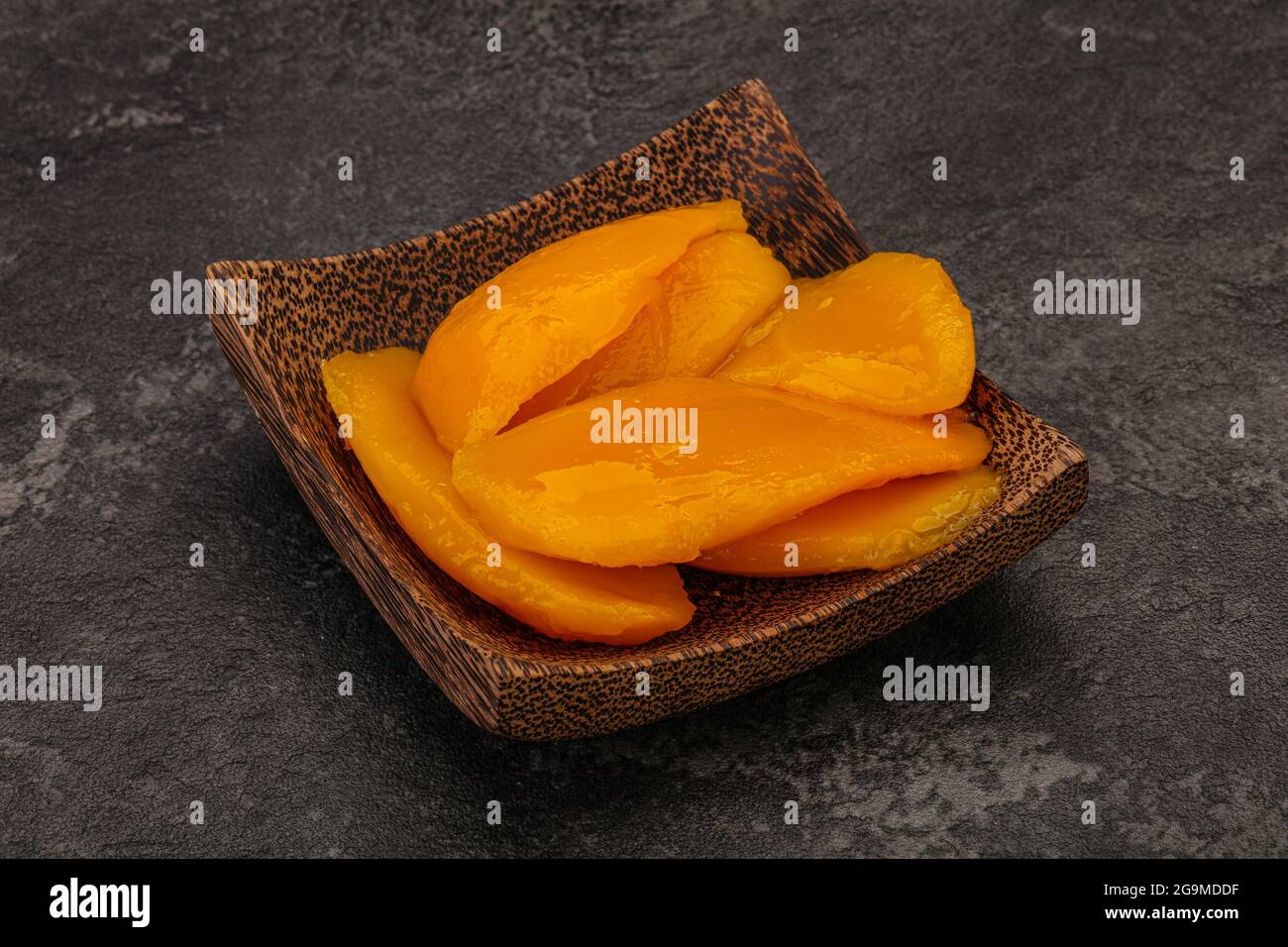 Sweet delicous mango slices in syrop Stock Photo - Alamy