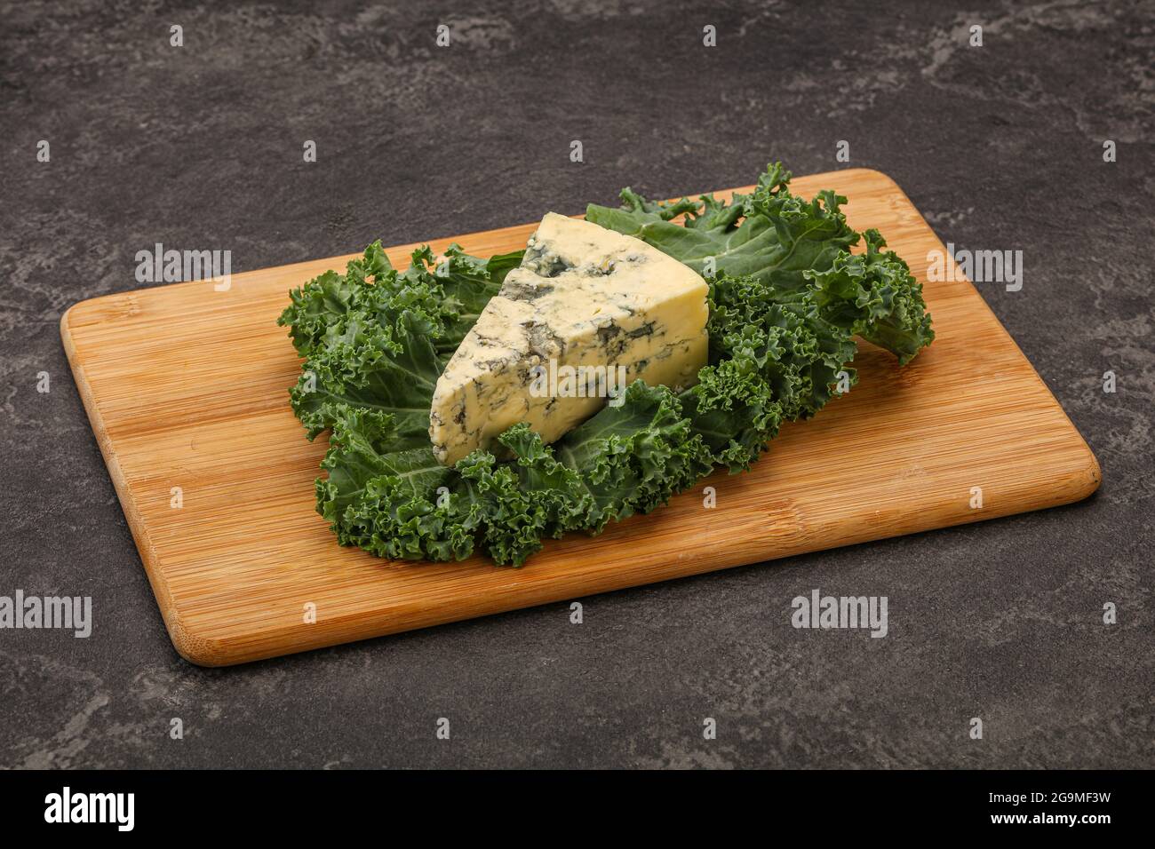Dairy Blue cheese triangle with mold Stock Photo - Alamy