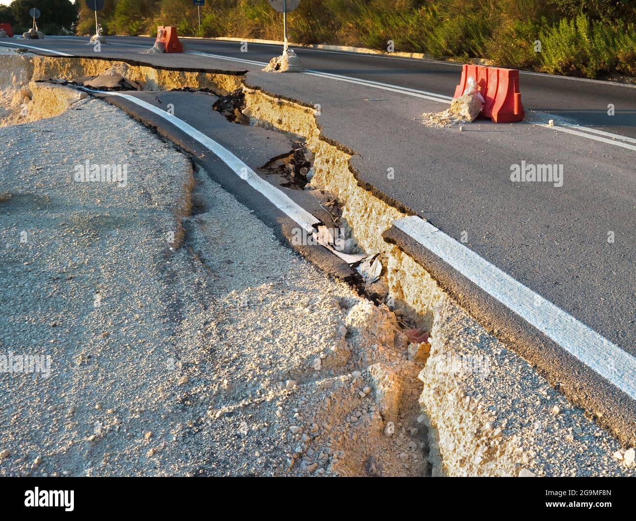broken road by an earthquake or landslide Stock Photo - Alamy