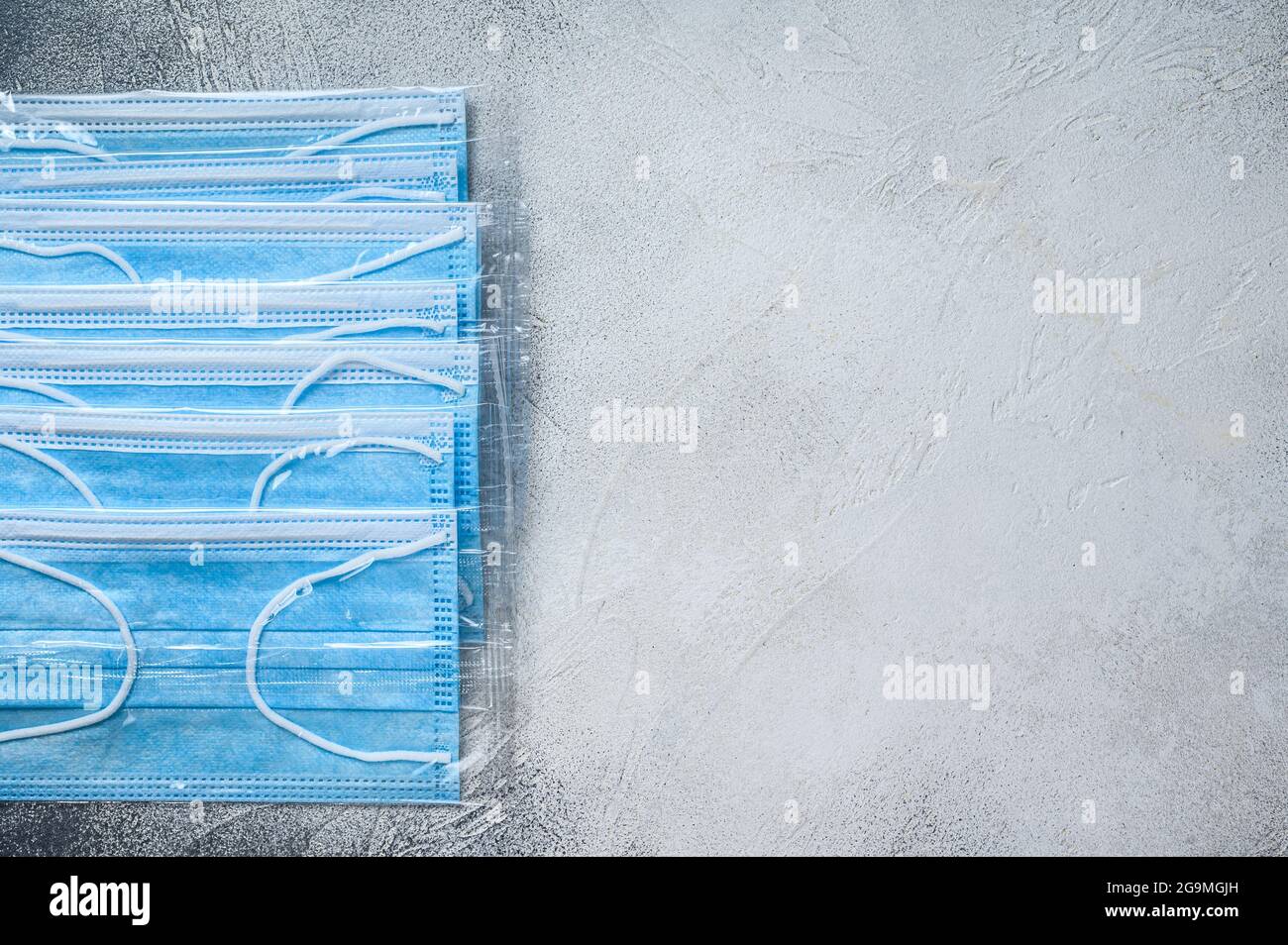 Blue ear loop surgical face masks. Disposable procedural face mask with ...